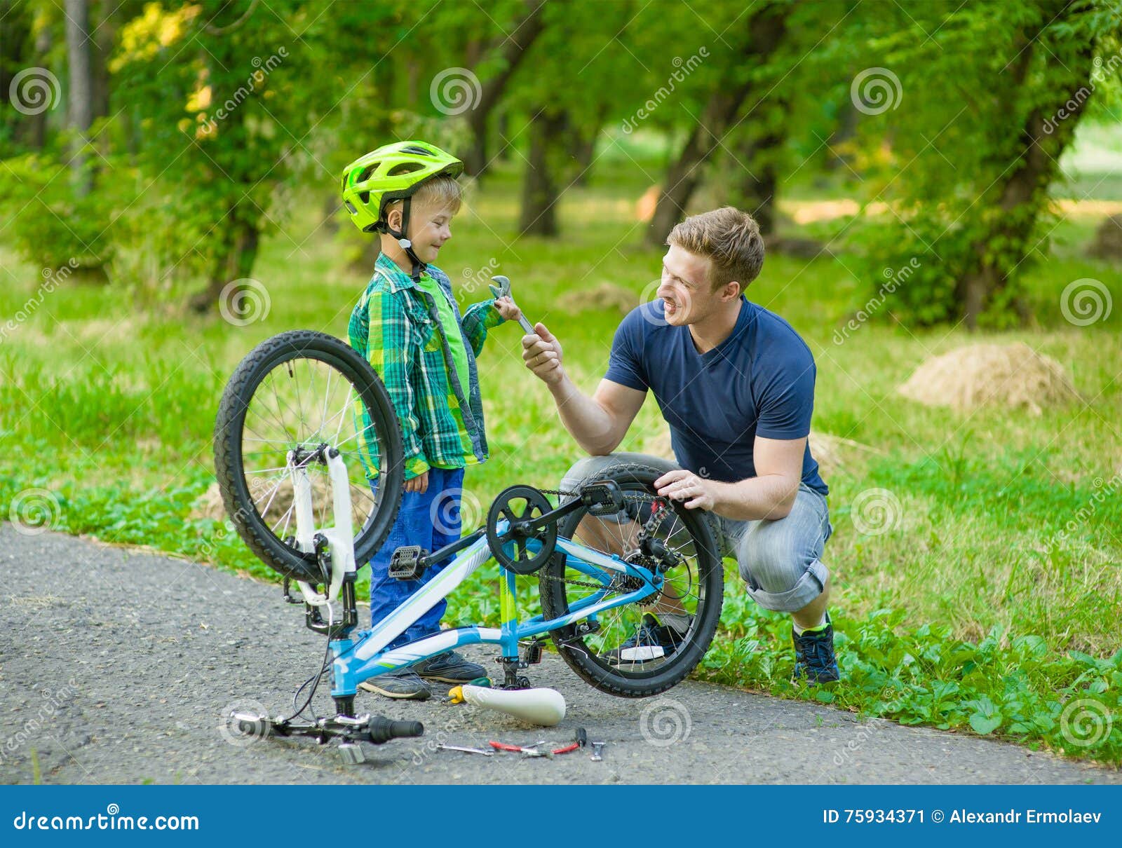 Father Helping His Son Bicycle Repair Stock Image - Image of care ...