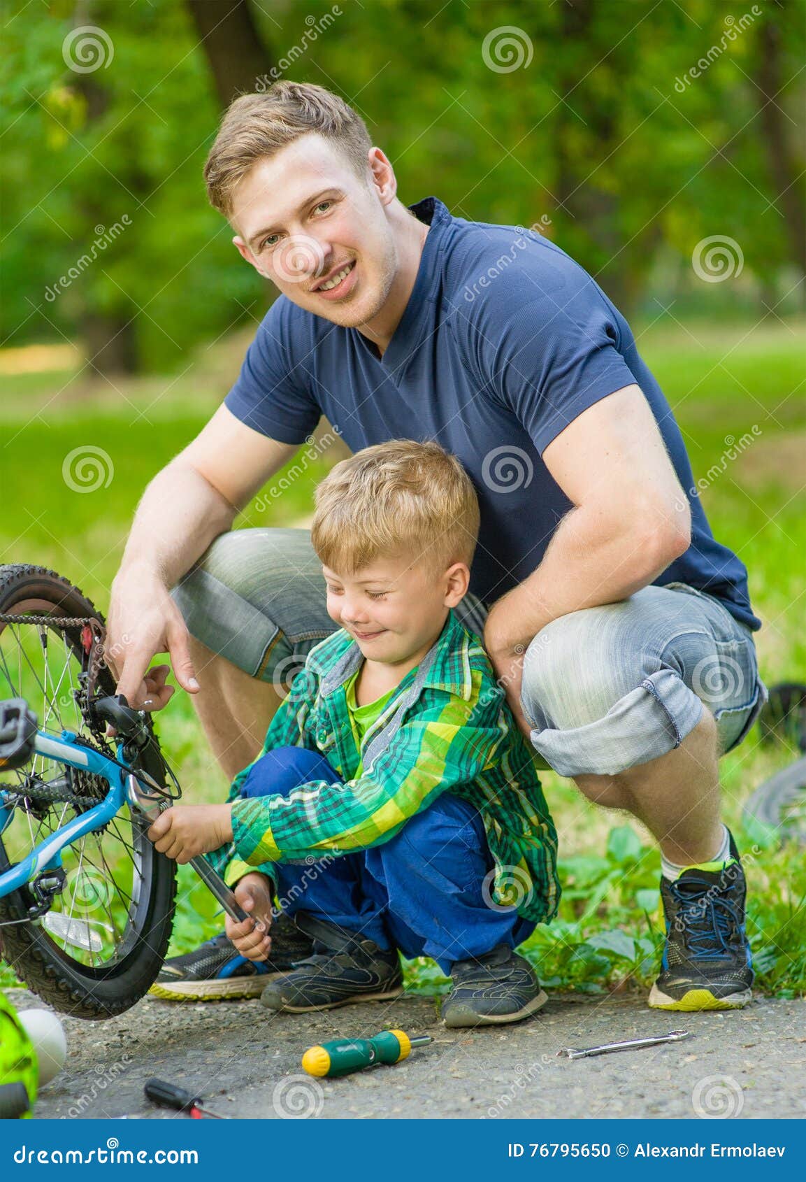 Father Helping His Son Fix Bicycle Stock Photo - Image of lifestyle ...