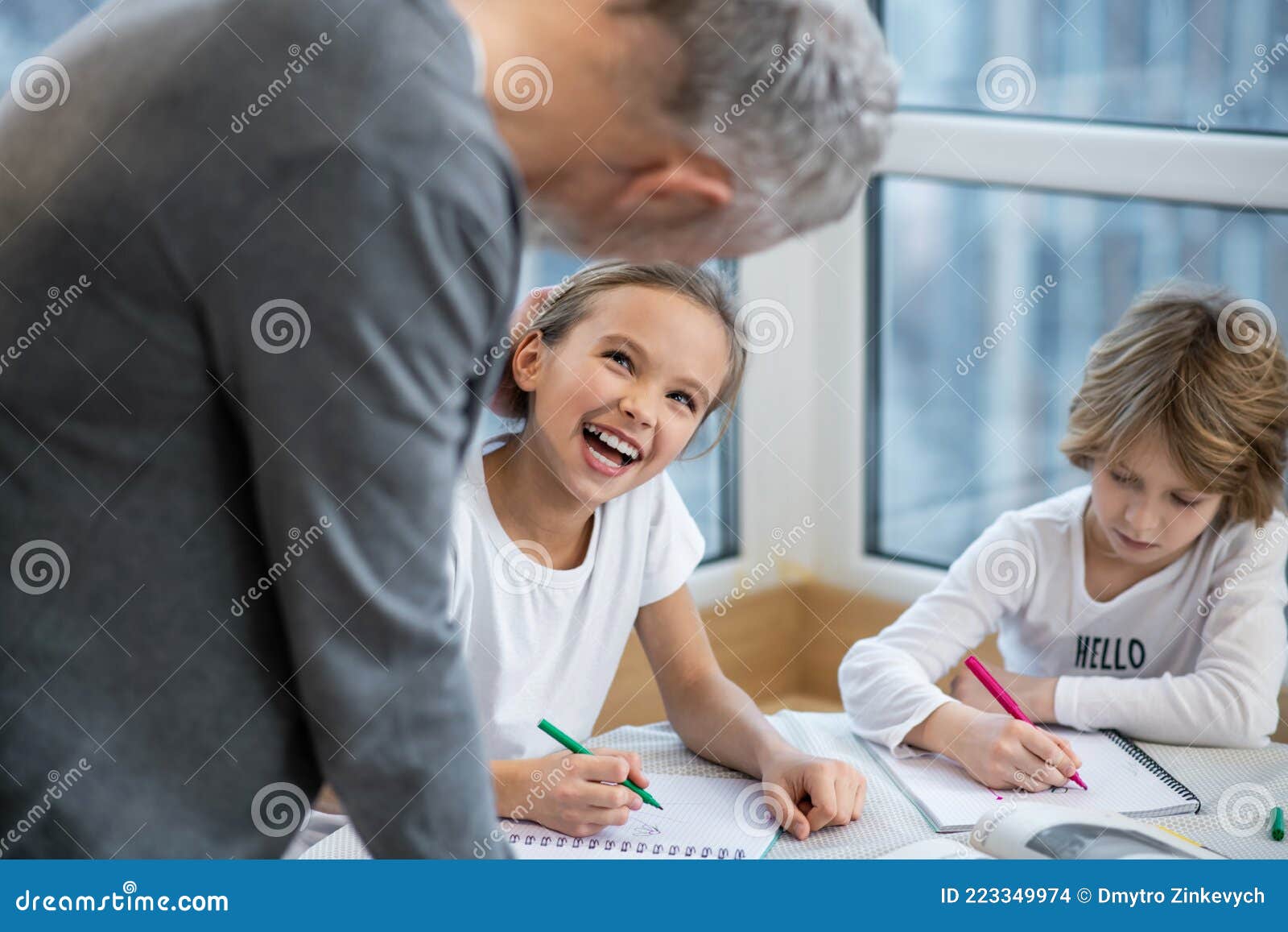 Father Helping Kids with Lessons and Explaining Them Something Stock ...