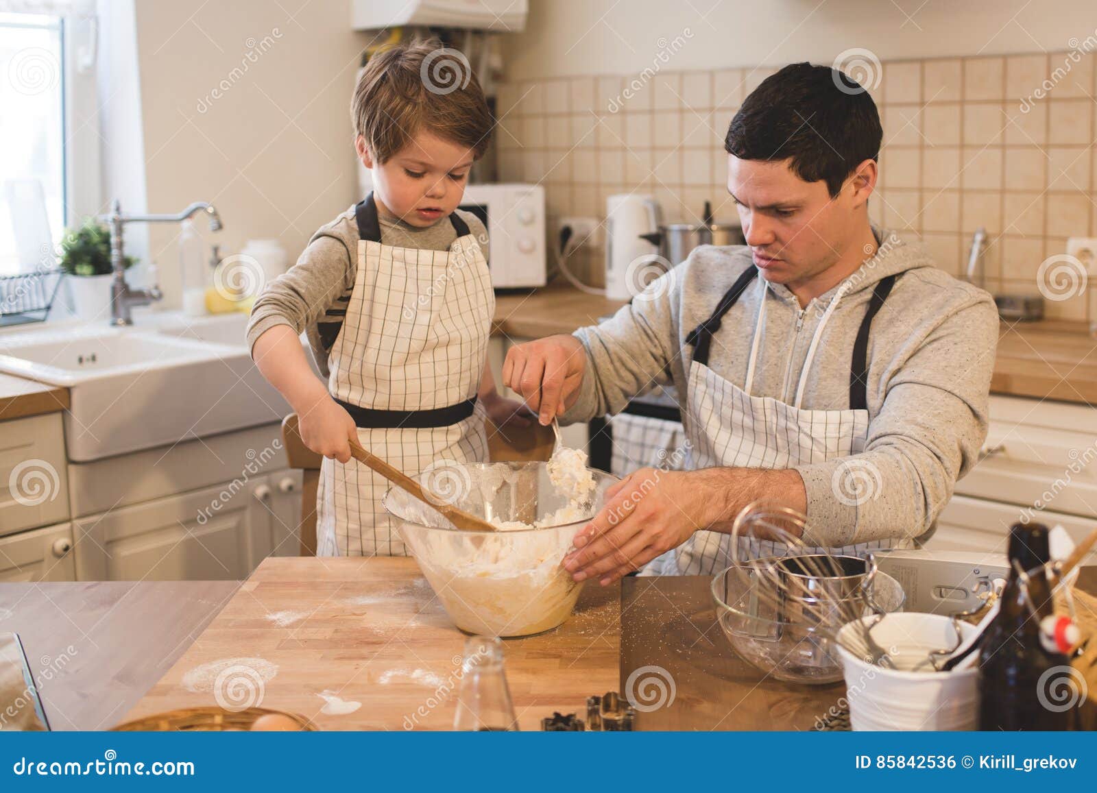 A Father and His Son Cooking Stock Photo - Image of flour, food: 85842536