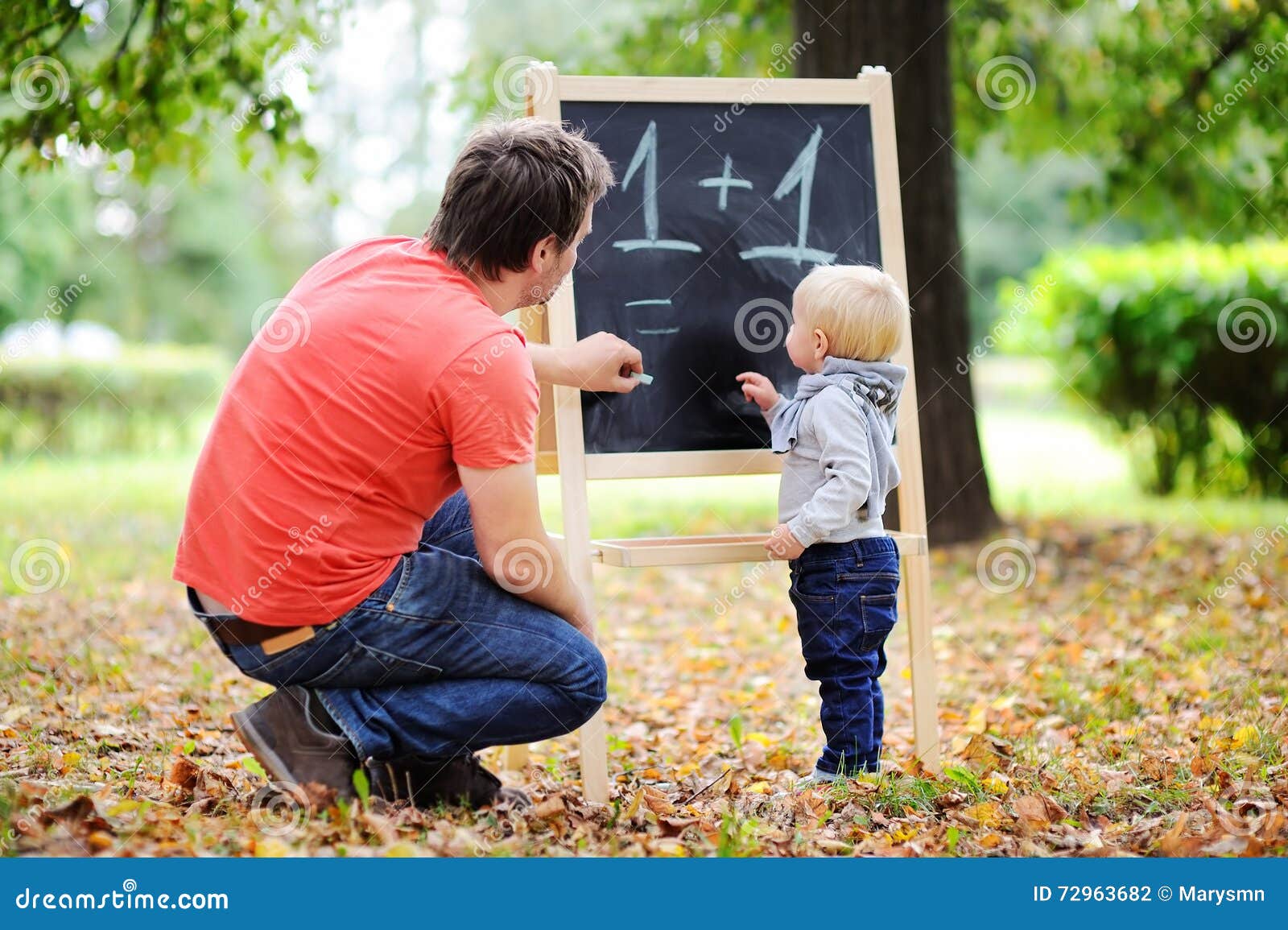 Father and His Son Practicing Mathematics Stock Photo - Image of back ...