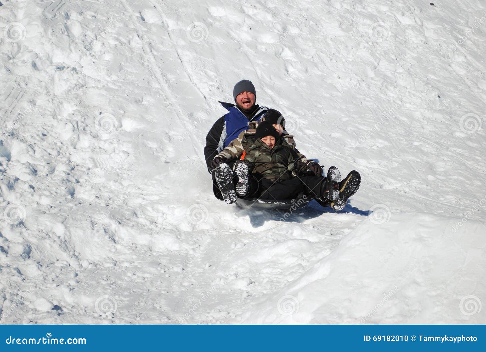Father and His Two Sons Sledding Stock Photo - Image of sledding, year ...