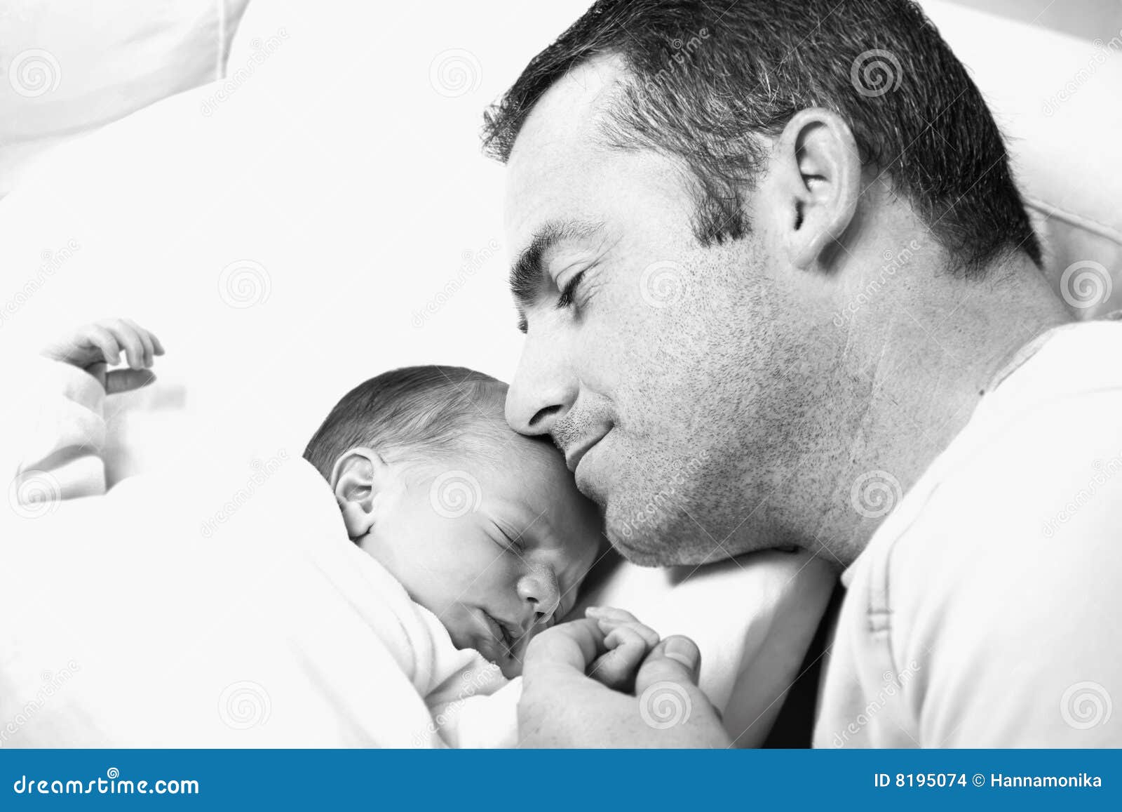 Newborn Baby And Father