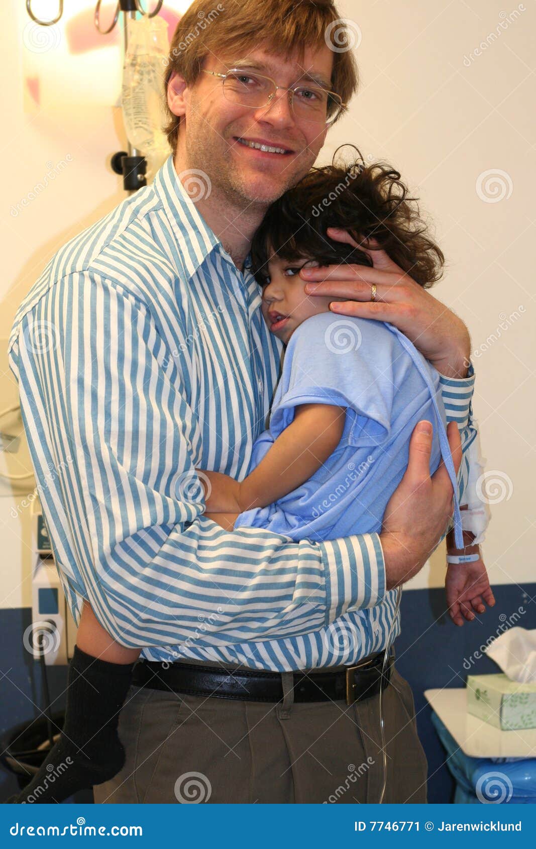 Father Holding Toddler Boy in ER Stock Image - Image of sick, room: 7746771