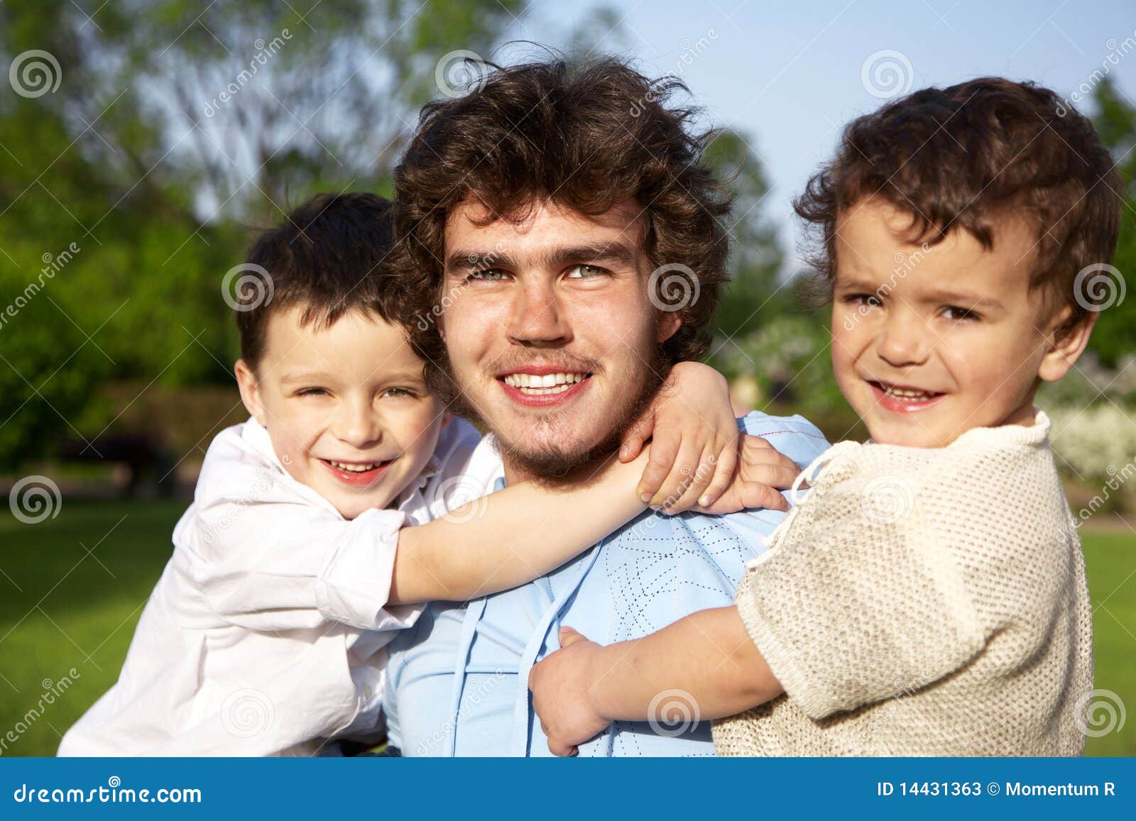 Father holding two sons stock image. Image of happiness - 14431363