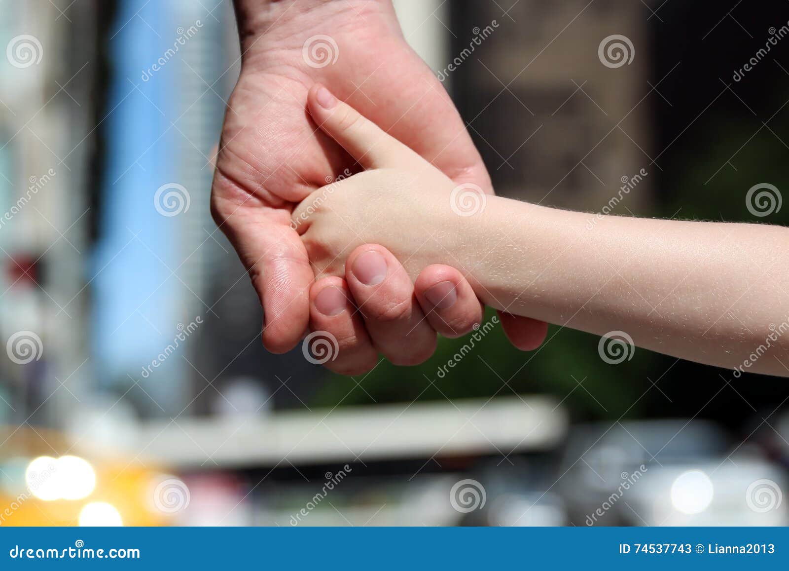 A Father Holds the Hand of a Small Child Outdoor Stock Image - Image of ...