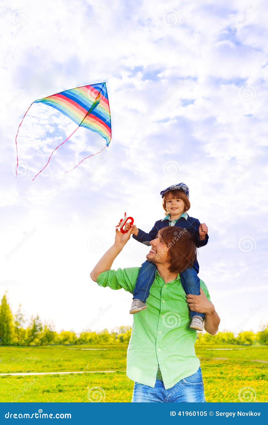 Father Holds Kid on Shoulders with Flying Kite Stock Image - Image of ...