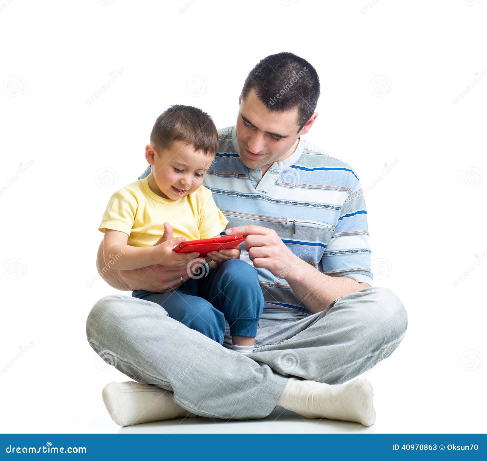 Father and Kid are Looking To Play and Read Tablet Computer Stock Image ...