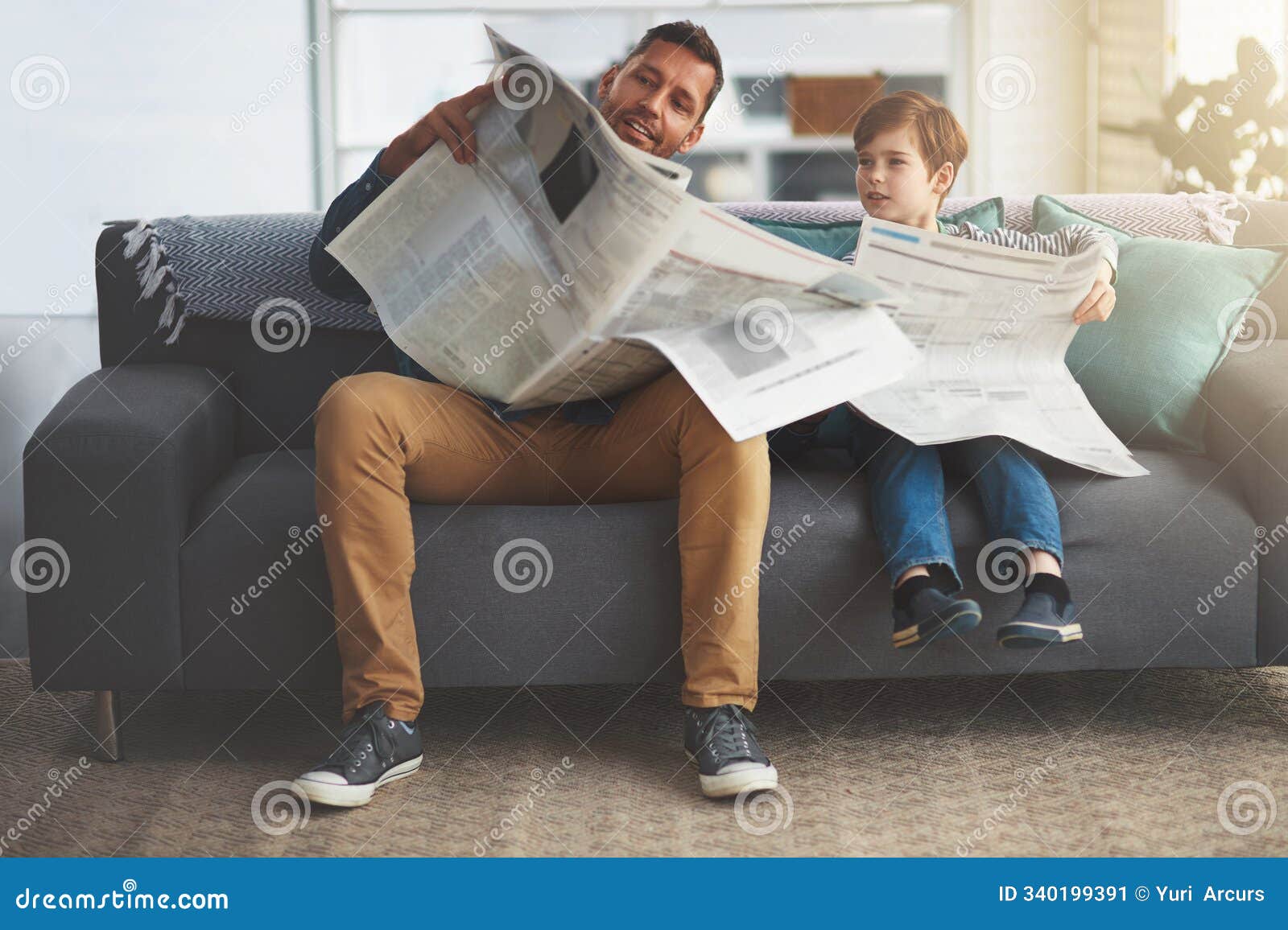 Father, Kid or Reading a Newspaper on Sofa in Home for Article ...