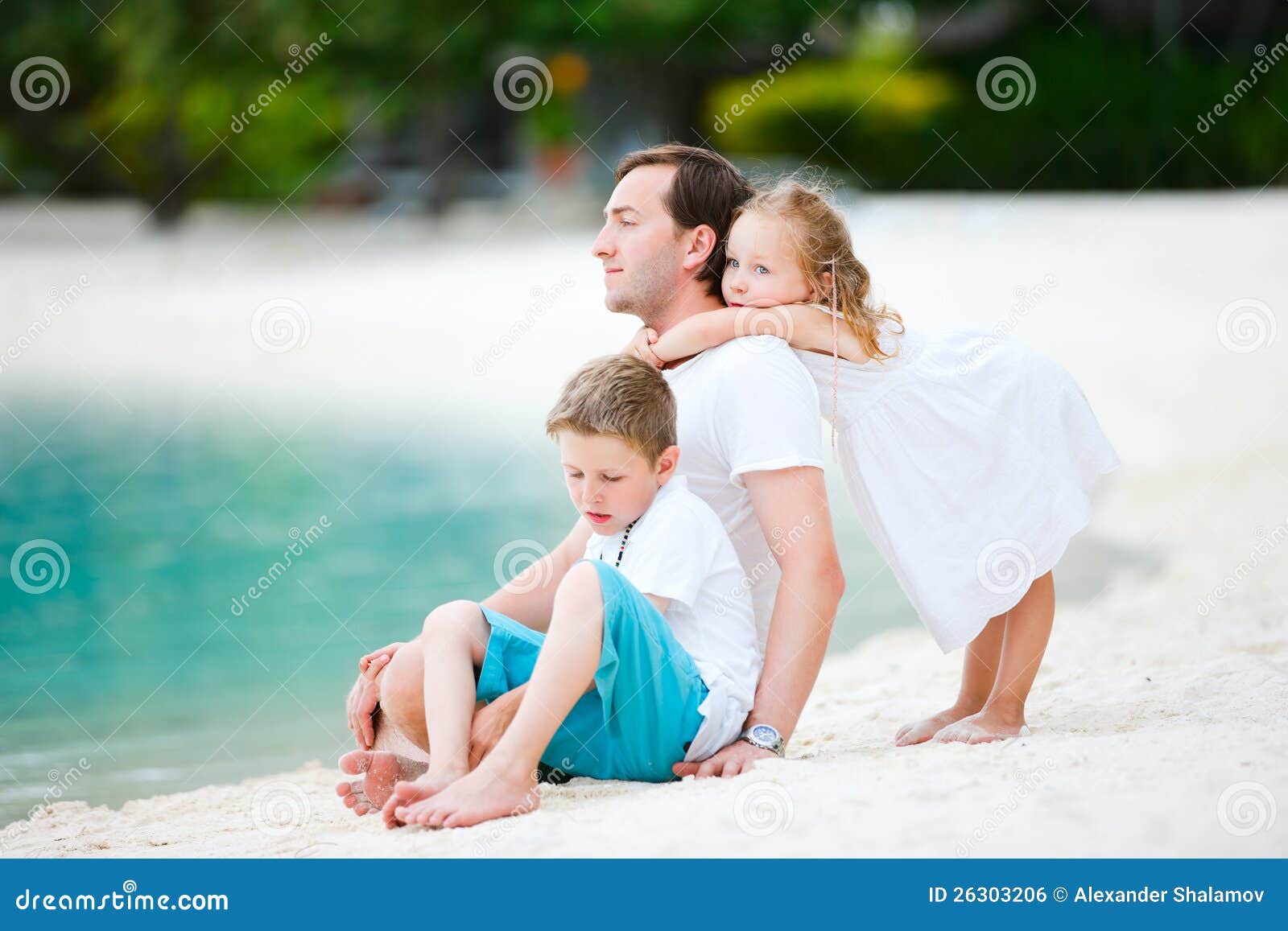Father and kids on a beach stock photo. Image of people - 26303206