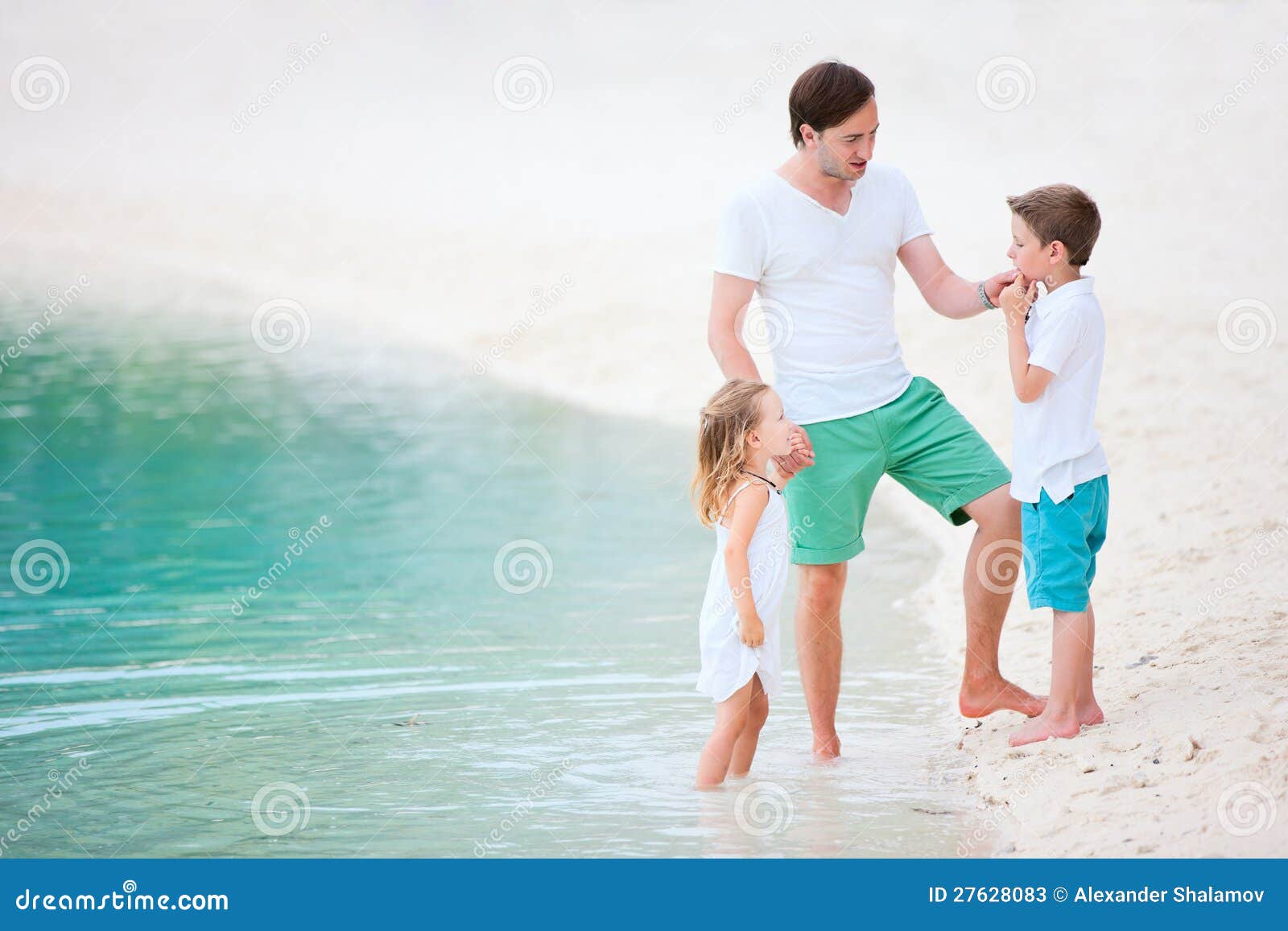 Father with kids at beach stock image. Image of seaside - 27628083
