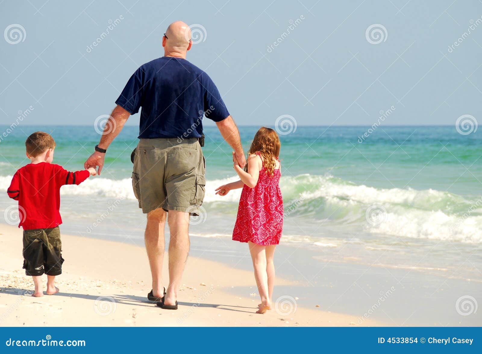 Father and Kids on Beach stock photo. Image of leisure - 4533854