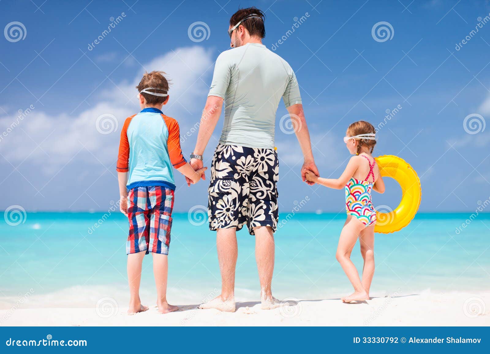 Father with kids at beach stock photo. Image of sibling - 33330792