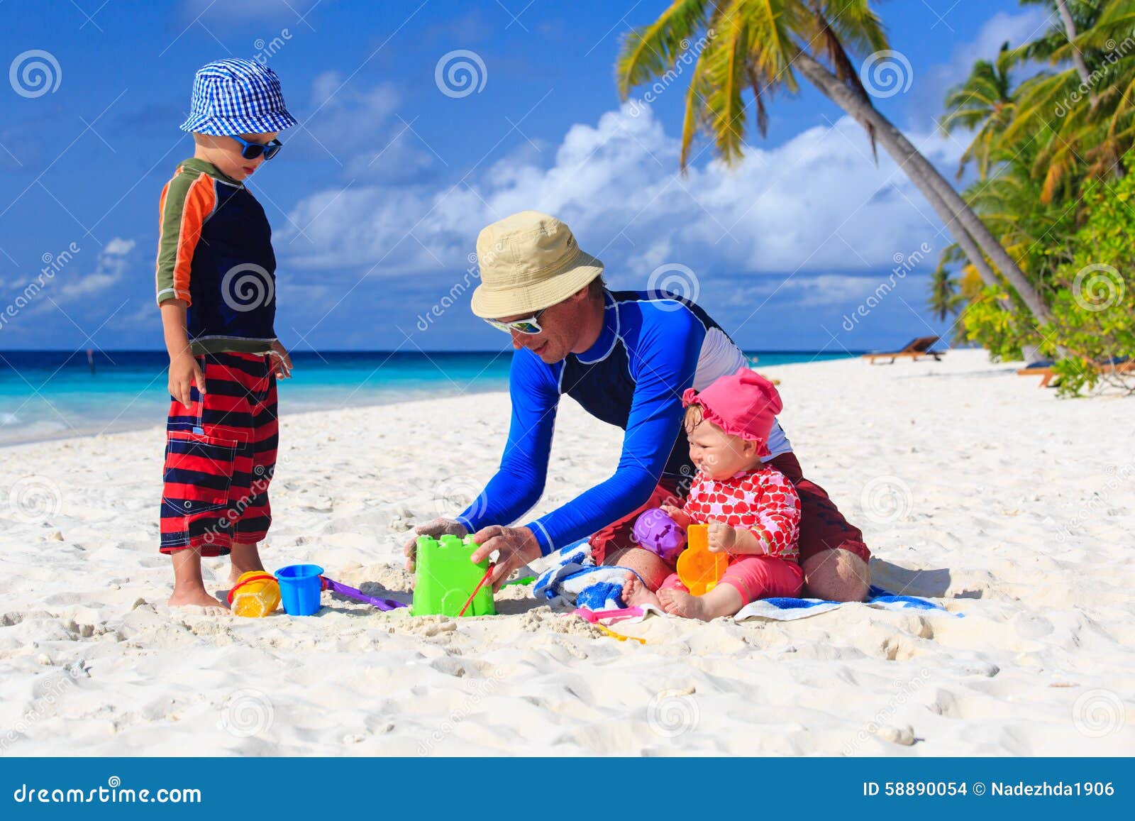 Father and Kids Making Sand Castle at Tropical Stock Photo - Image of ...