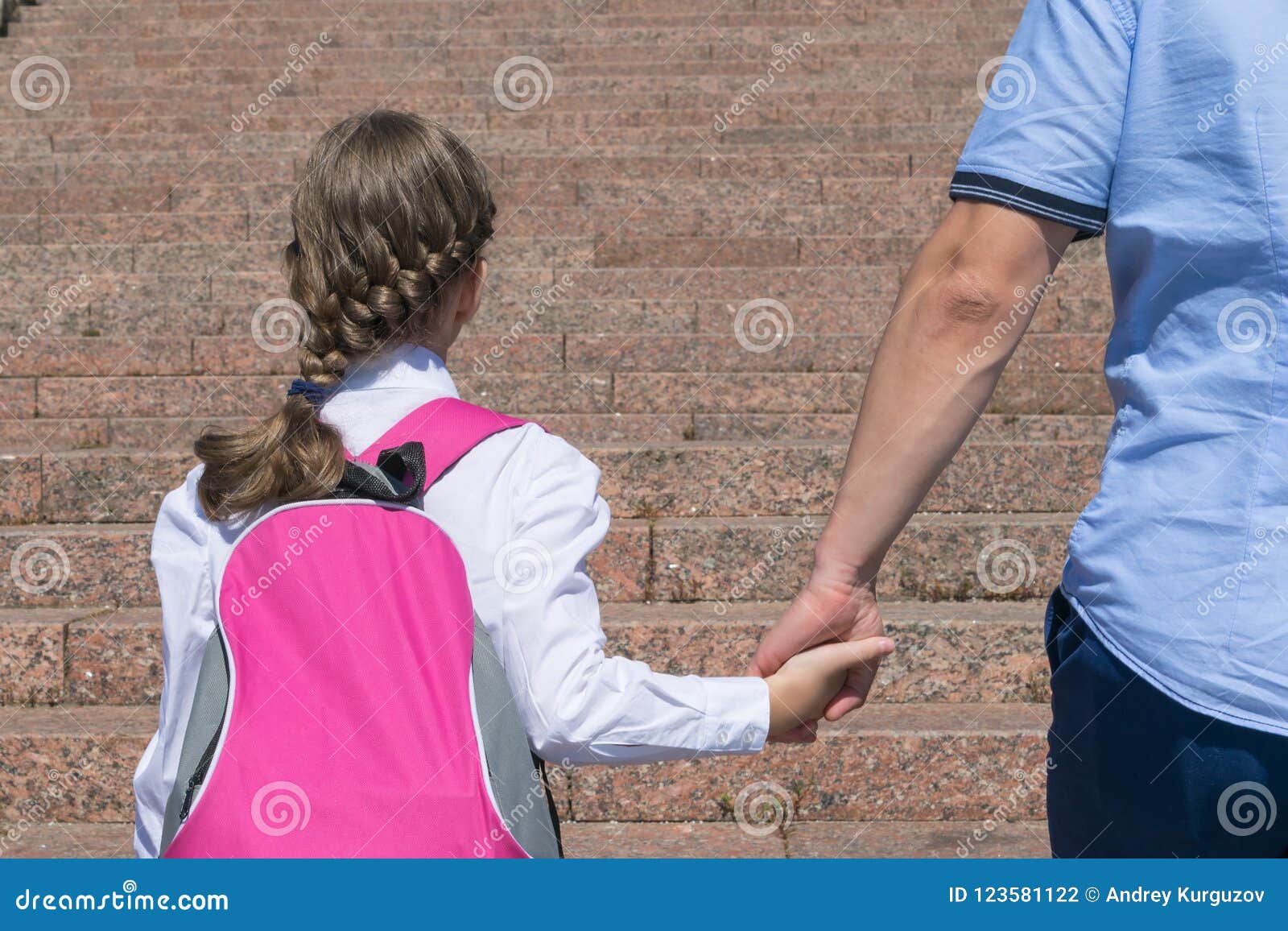 Father Leads Daughter To School In First Grade. First Day At School ...