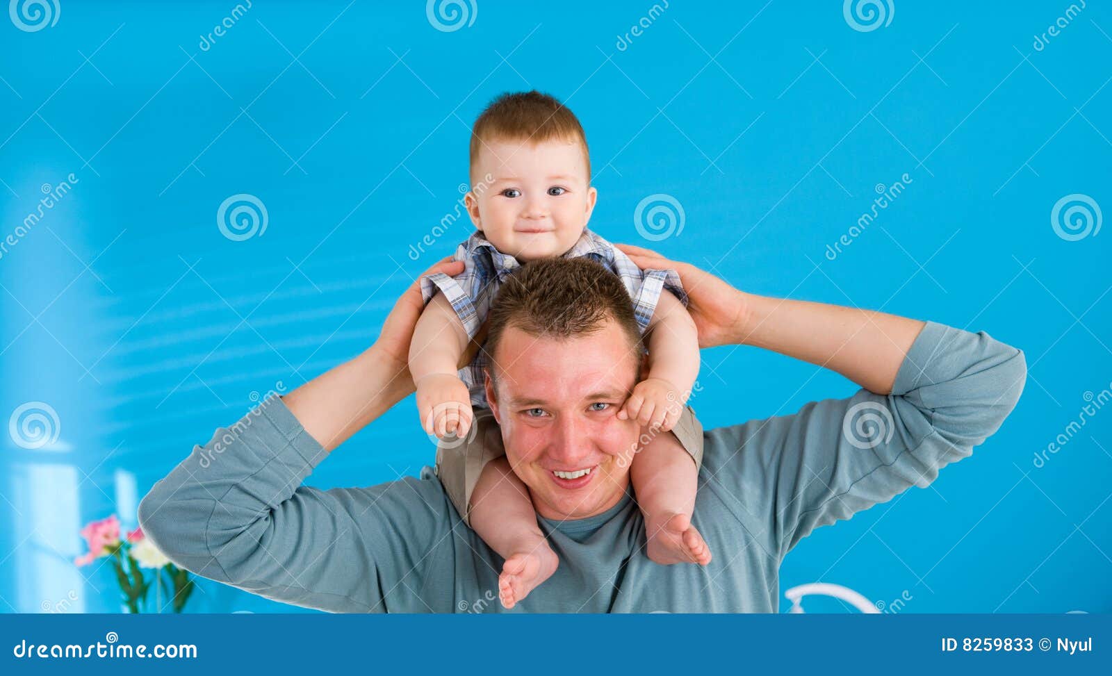 Father lifting happy baby stock image. Image of friendly - 8259833