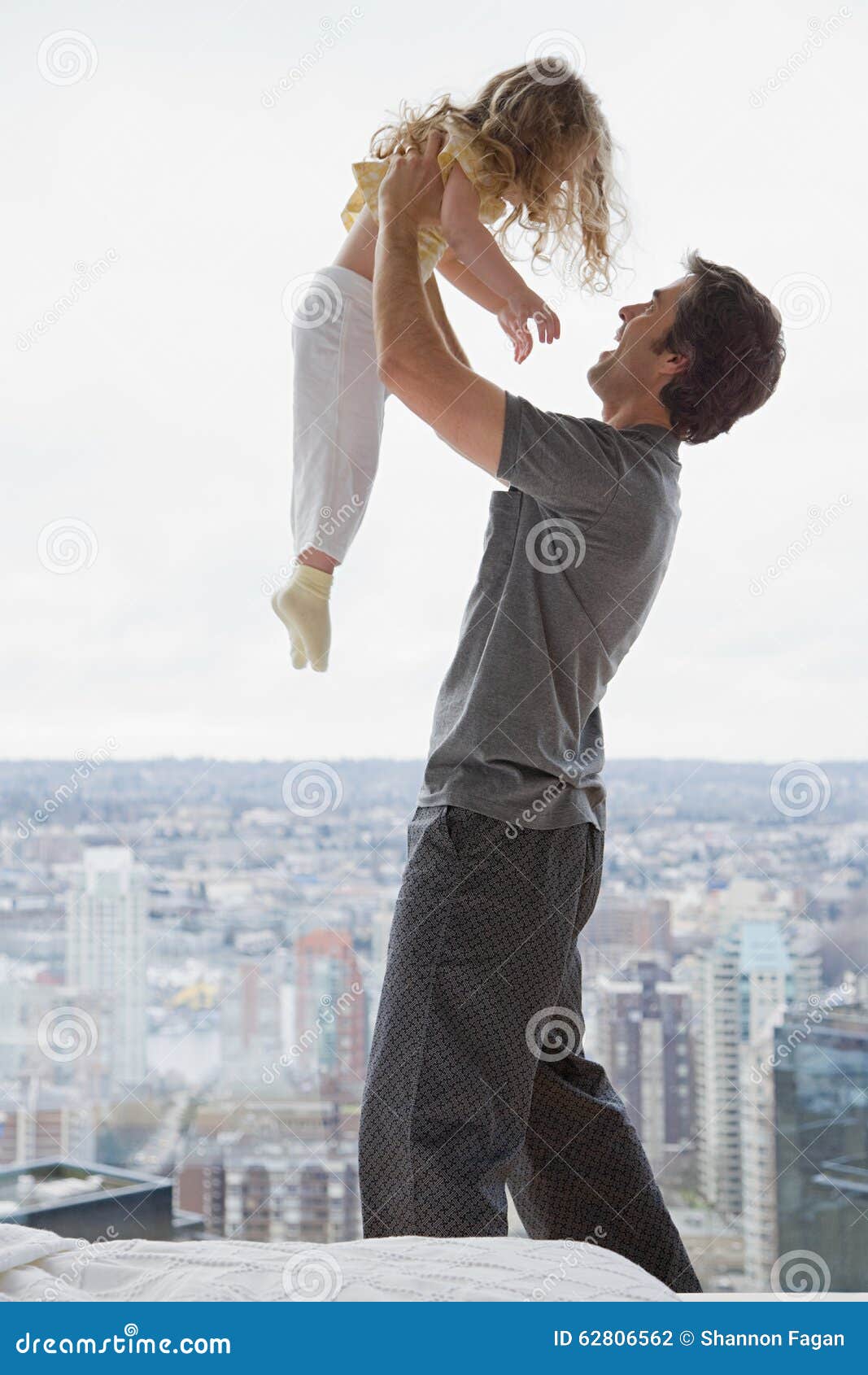 Father Lifting His Daughter Stock Photo - Image of fatherhood, adorable ...