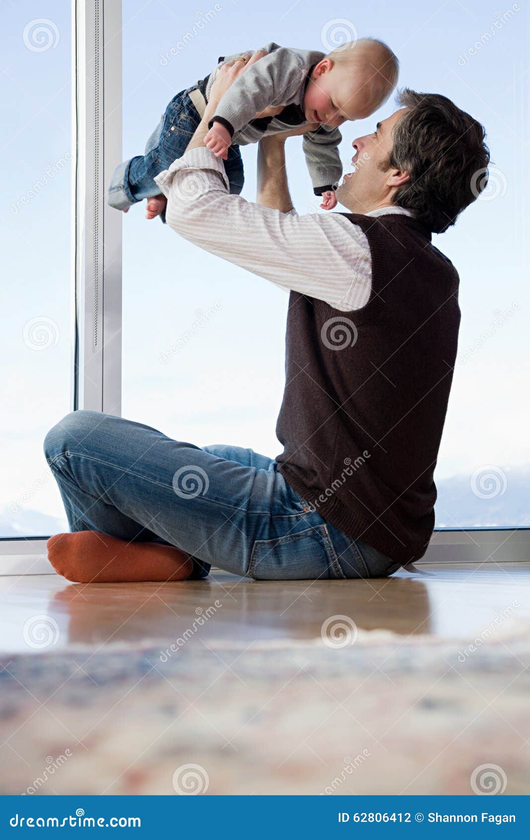 Father lifting his son stock photo. Image of lifting - 62806412