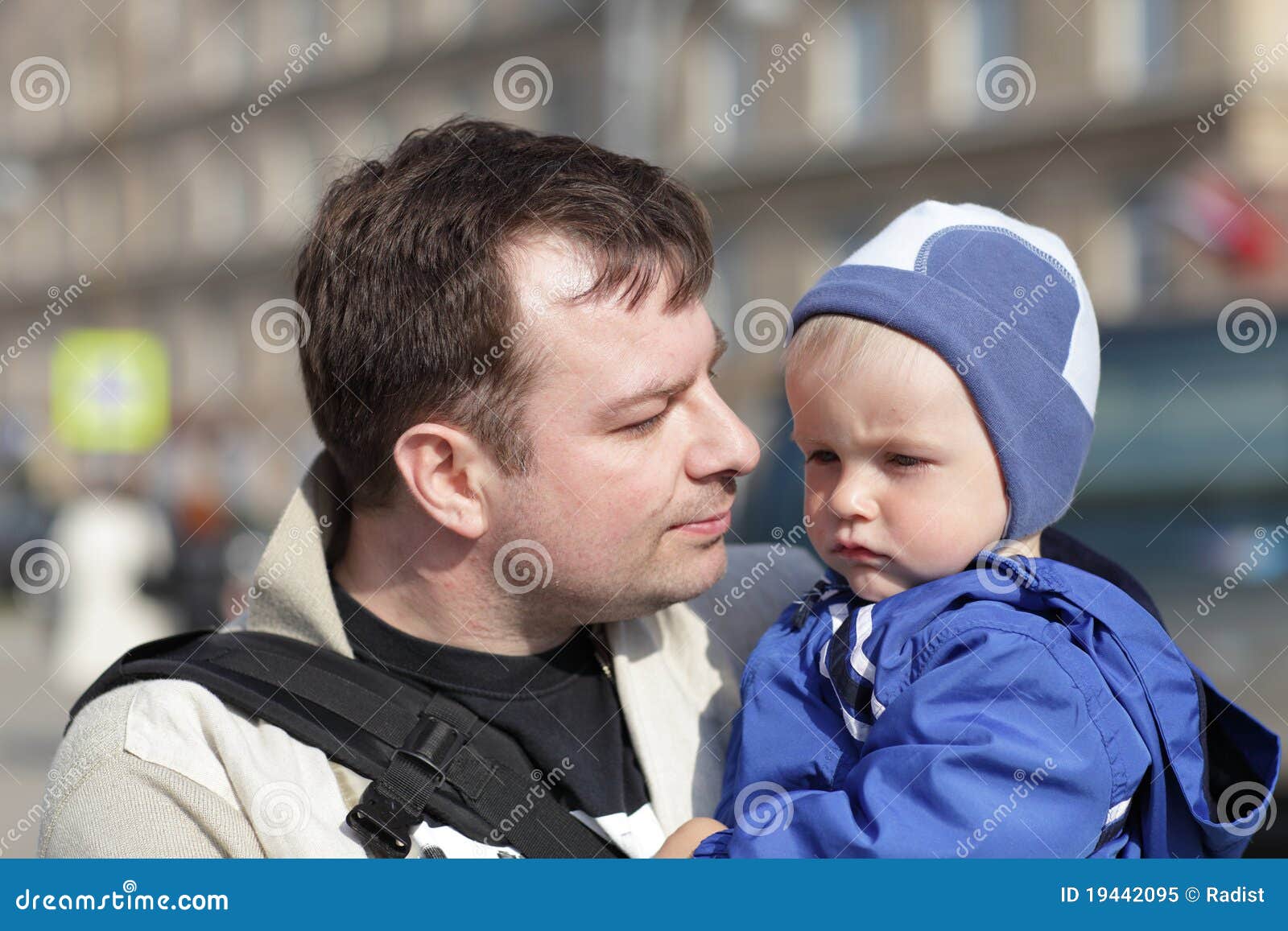 Father looks at boy stock image. Image of carry, laughing - 19442095