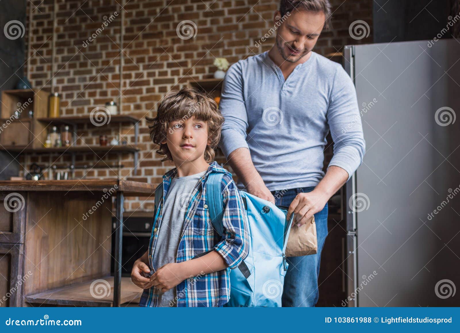 Father Packing Son for School Stock Photo - Image of relationship, home ...
