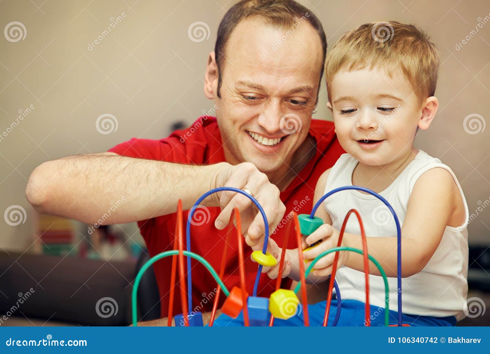 Father Playing with Child in Developing Game Stock Photo - Image of ...