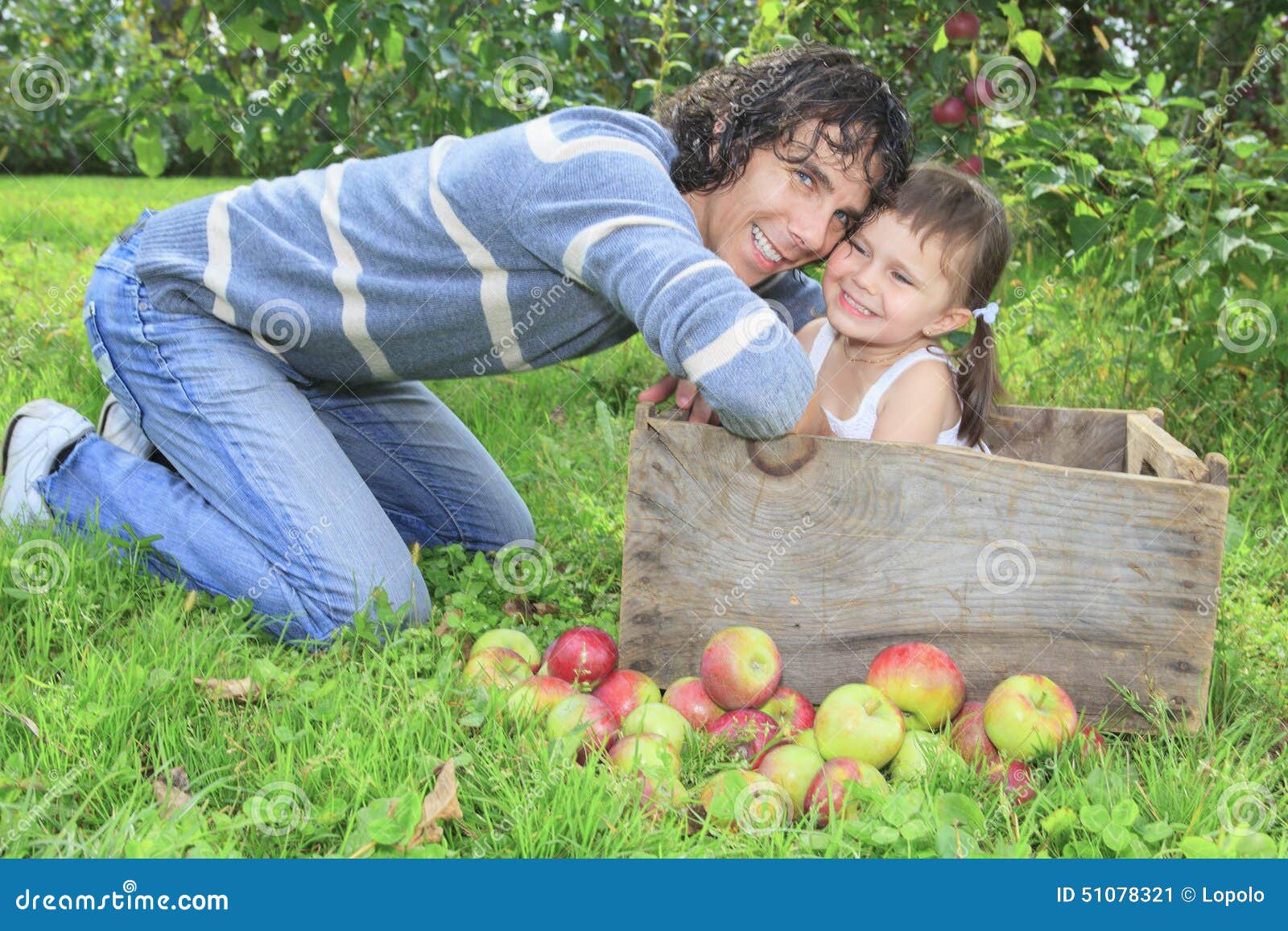 Father Playing with Her Daughter on Apple Tree Stock Image - Image of ...