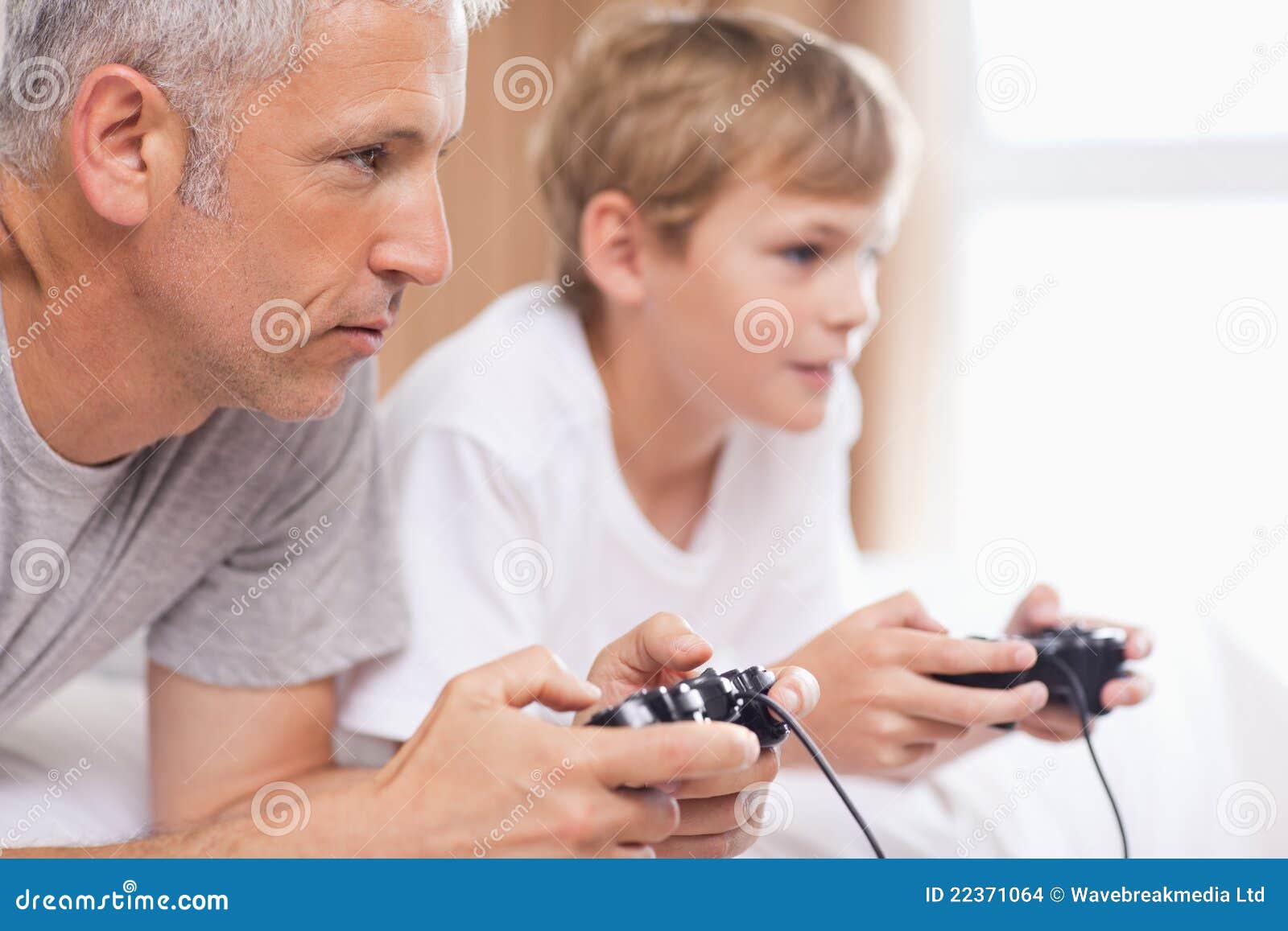 Father Playing Video Games with His Son Stock Photo - Image of 1011 ...