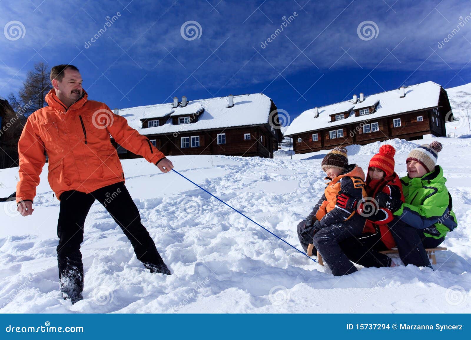 Father Pulling Kids on Sledge Stock Photo - Image of seated, homes ...