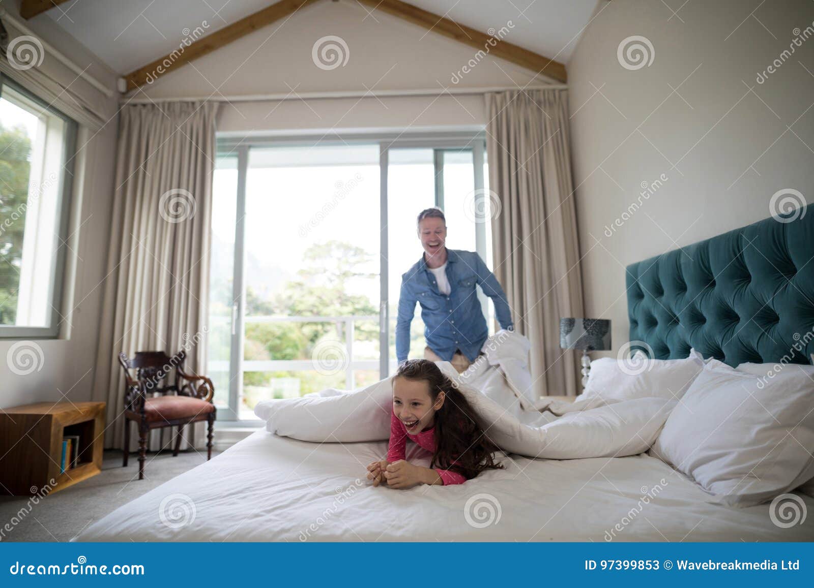 Father Putting a White Blanket Over His Daughter Stock Image - Image of ...