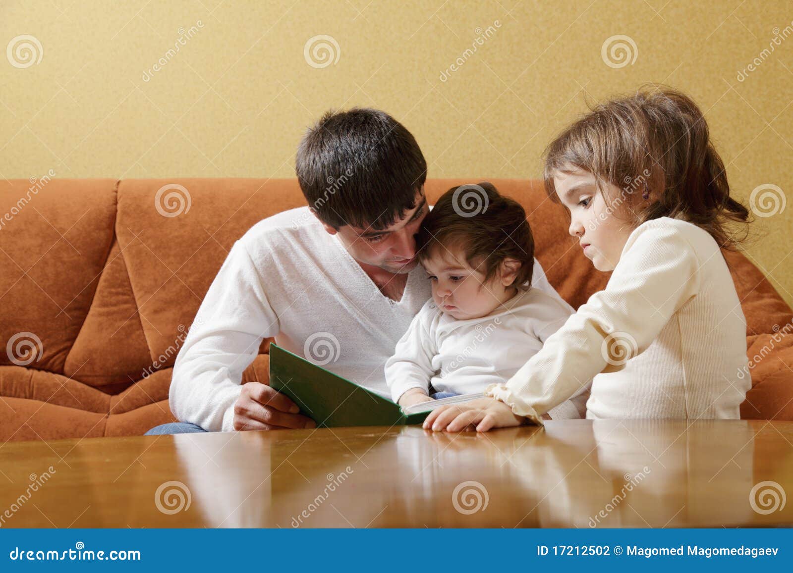 Father Reading Book To Daughters Stock Photo - Image of cute, cosiness ...