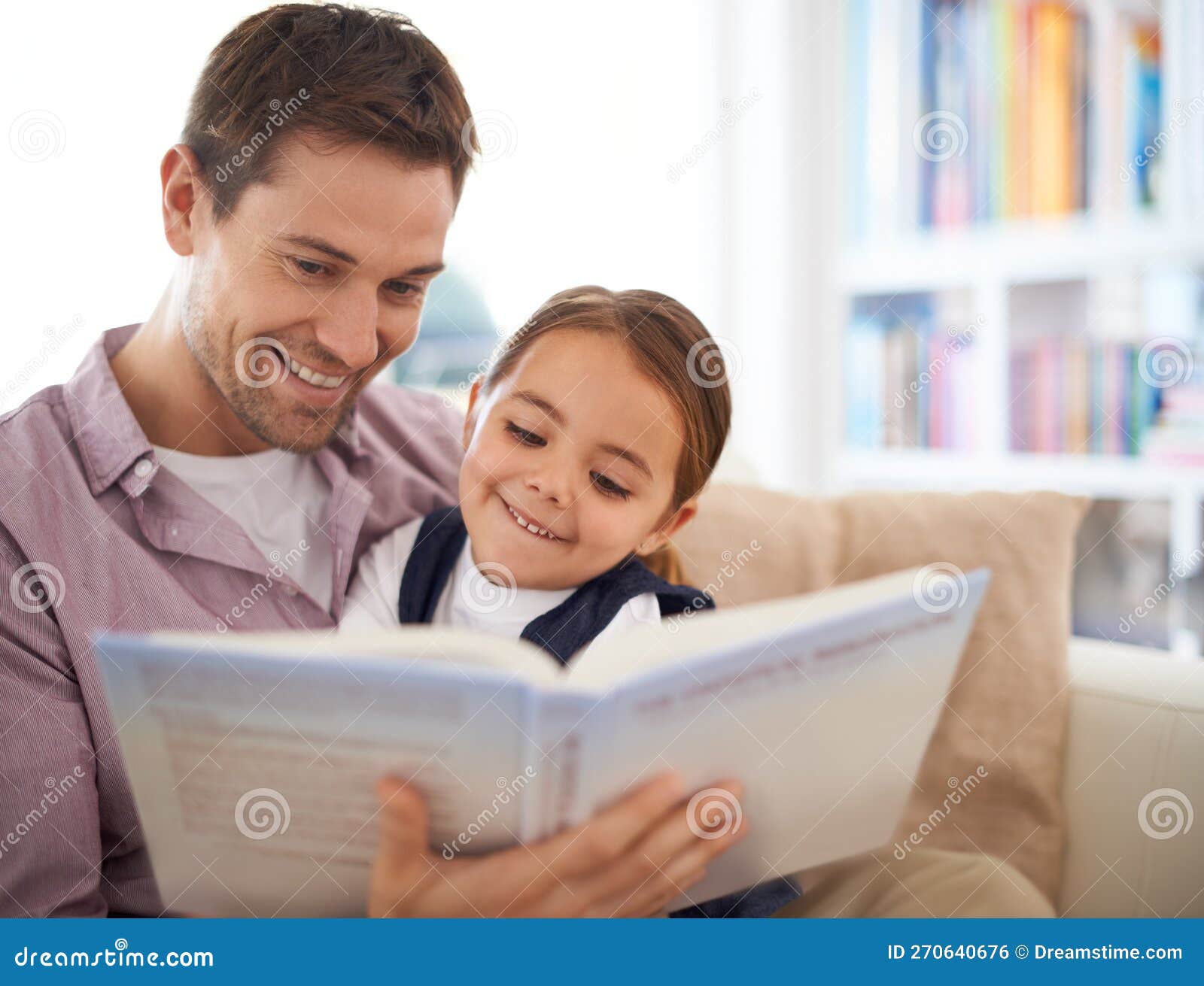 Reading Her Favourite Story. a Father Reading a Story. Stock Photo ...