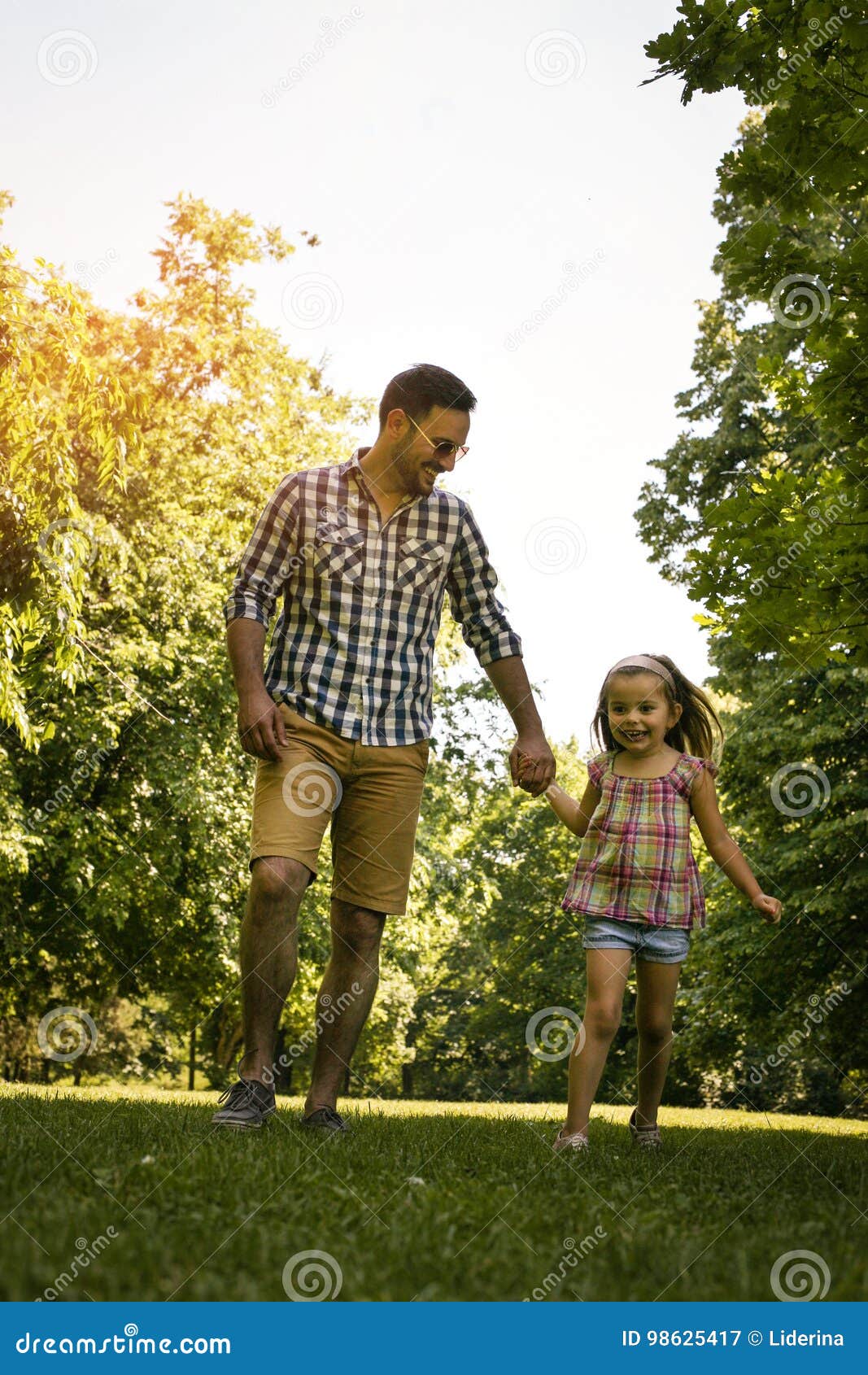 Father Running in the Meadow with Daughter. Stock Image - Image of ...