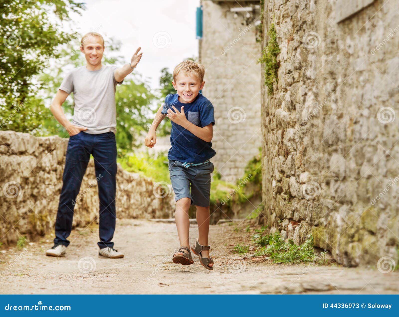 Father and Running Son on Old Street Stock Image - Image of hands ...