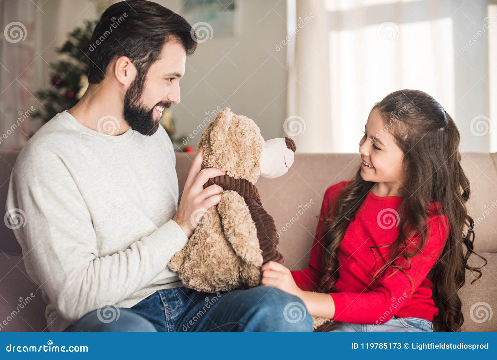 Father Showing Daughter Teddy Stock Image - Image of adorable, focus ...