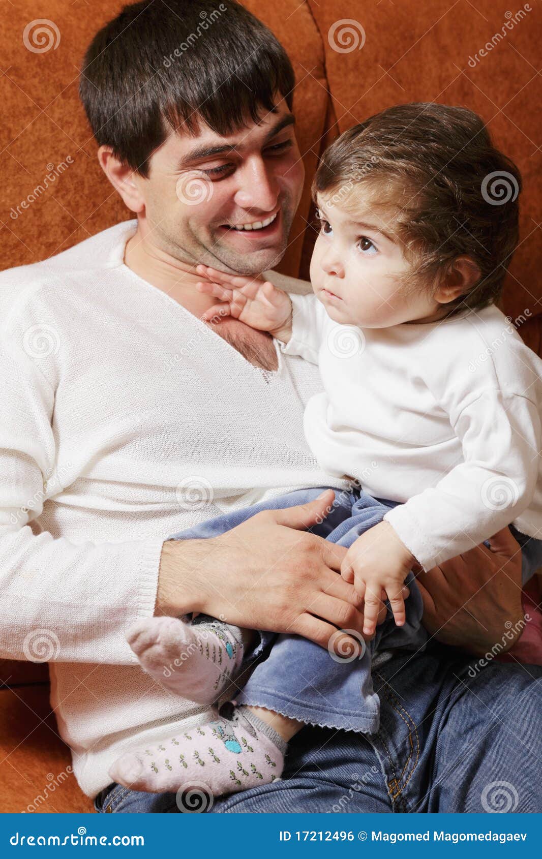 Father Sitting with Little Daughter on Sofa Stock Photo - Image of ...