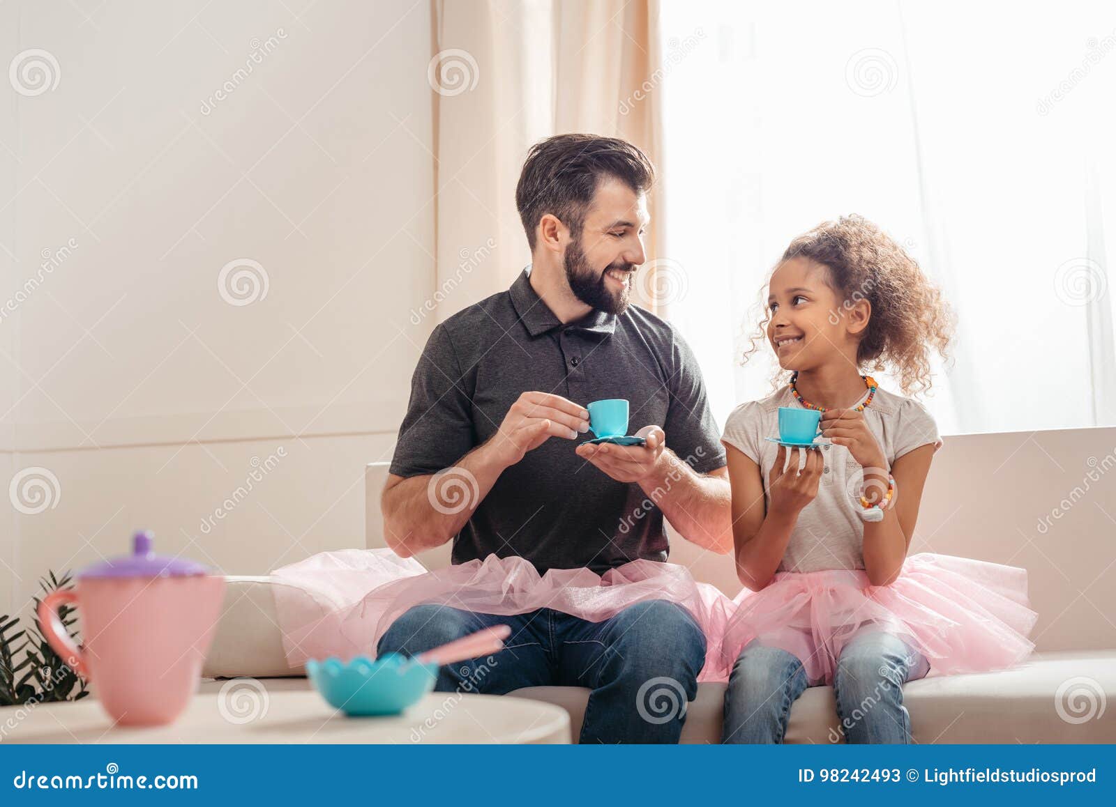 Father and Smiling Daughter Having Tea Party at Home Stock Image ...