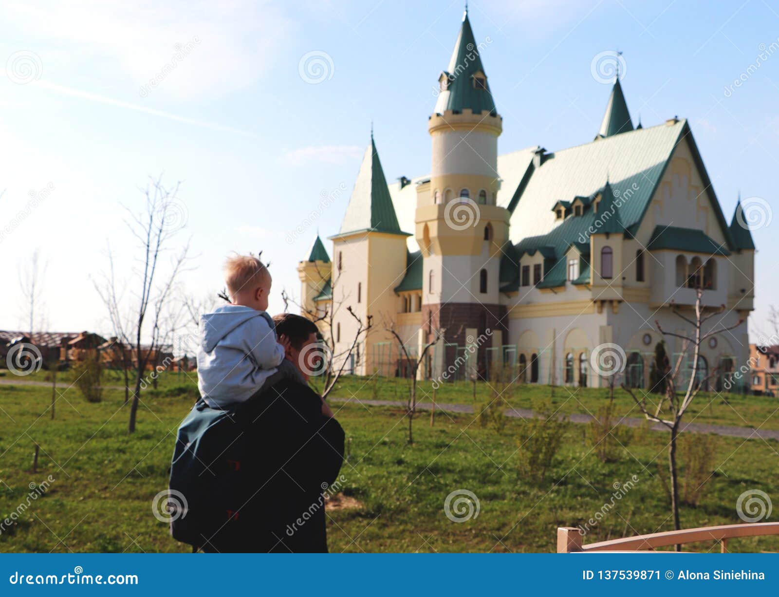 Father and Son Against the Backdrop of the Castle. the Concept of ...