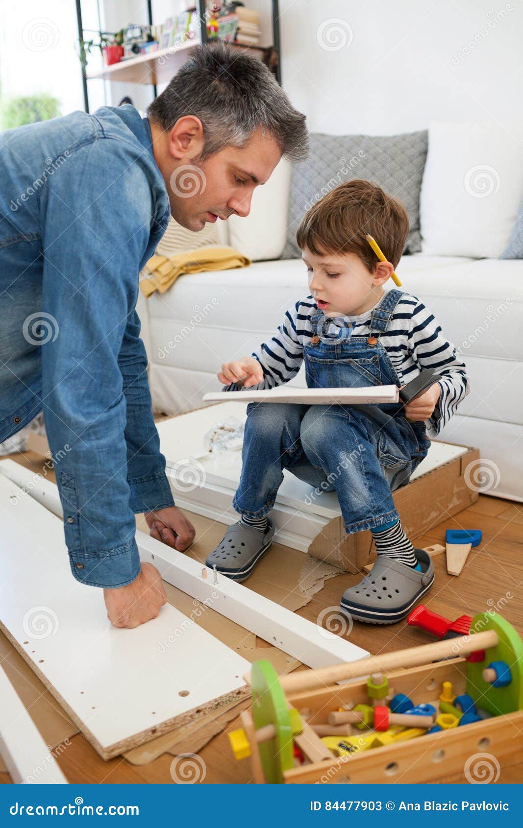 Father and Son Assembling Furniture Stock Image - Image of help, daddy ...
