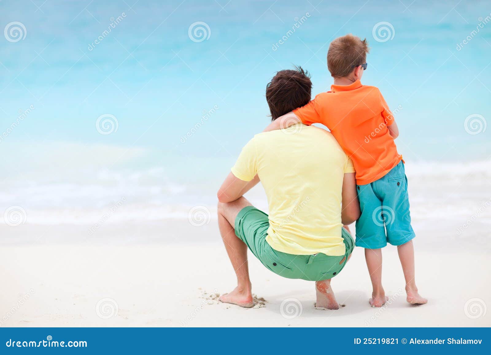Father and son at beach stock image. Image of parent - 25219821