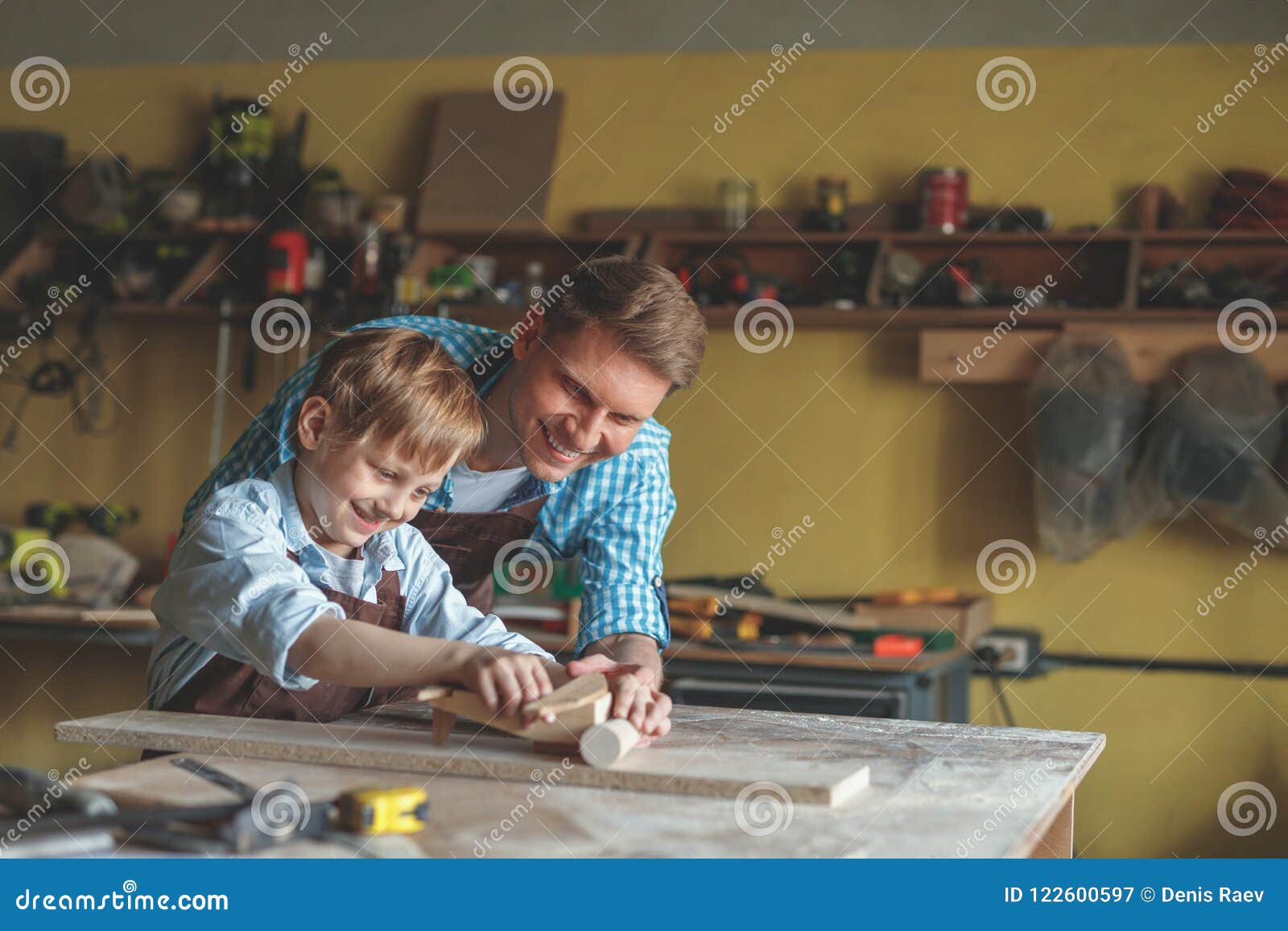 Father and Son in Carpentry Stock Image - Image of father, young: 122600597