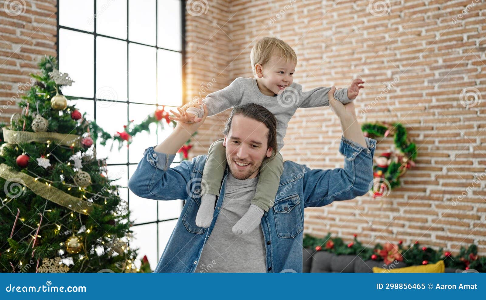 Father and Son Celebrating Christmas Dancing at Home Stock Image ...