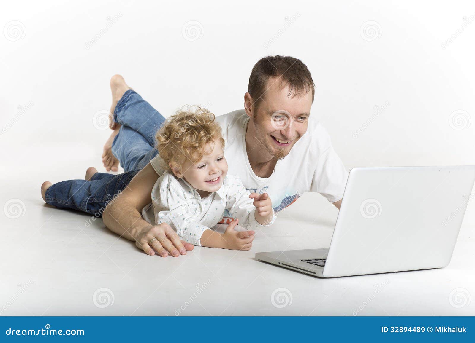 Father and Son are on Computer on the Floor Stock Image - Image of ...