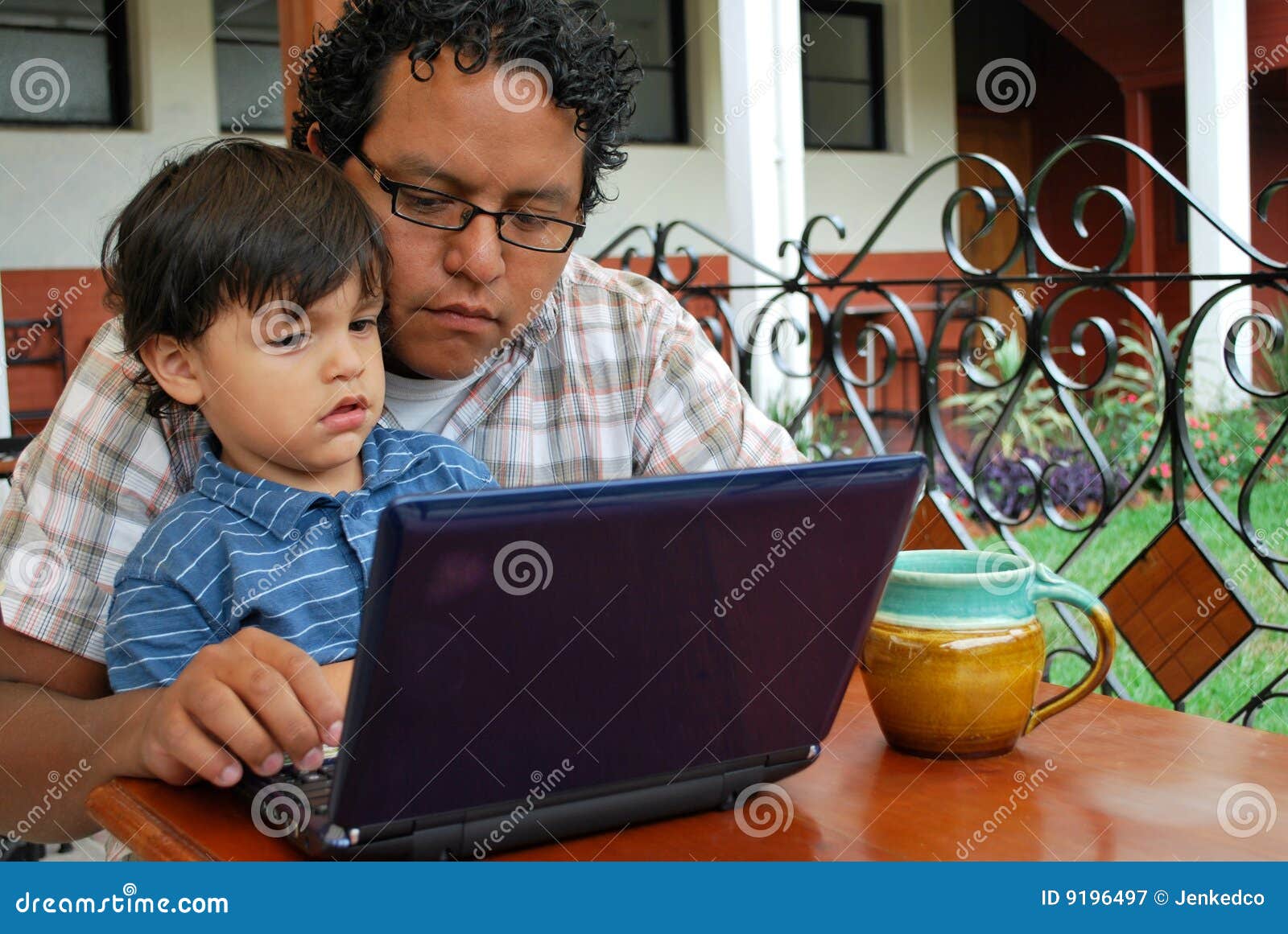 Father and Son on Computer Together Stock Image - Image of campus ...