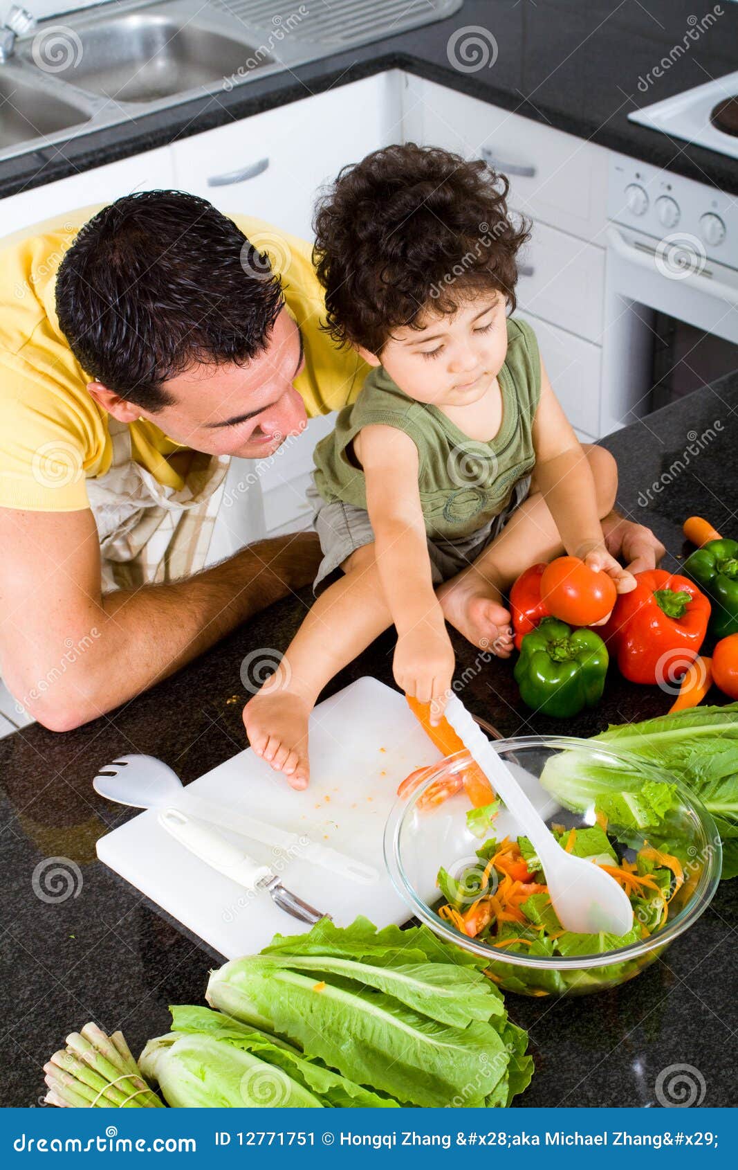 Father and son cooking stock image. Image of cooking - 12771751