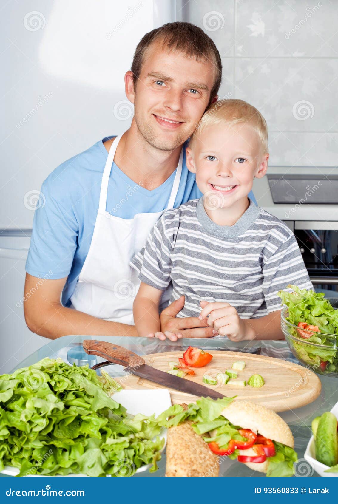 Father and son cooking stock image. Image of child, greenery - 93560833
