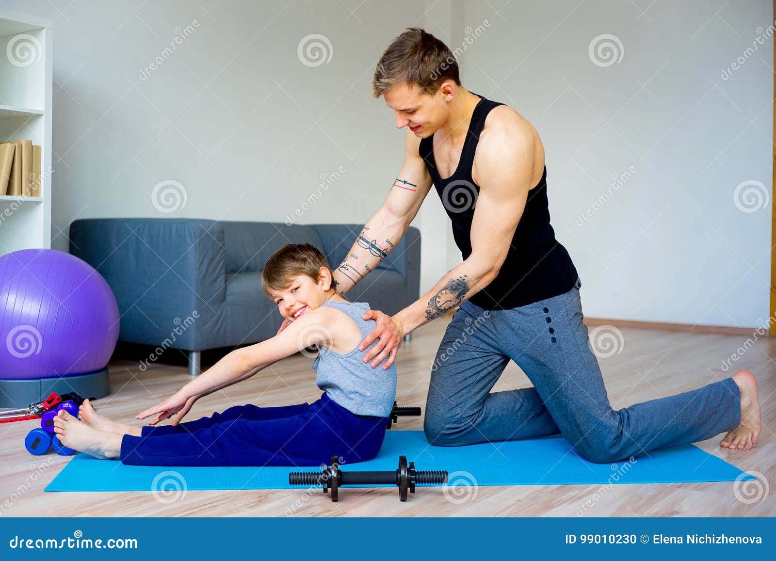Father and Son Doing Sit Ups Stock Photo - Image of child, childhood ...