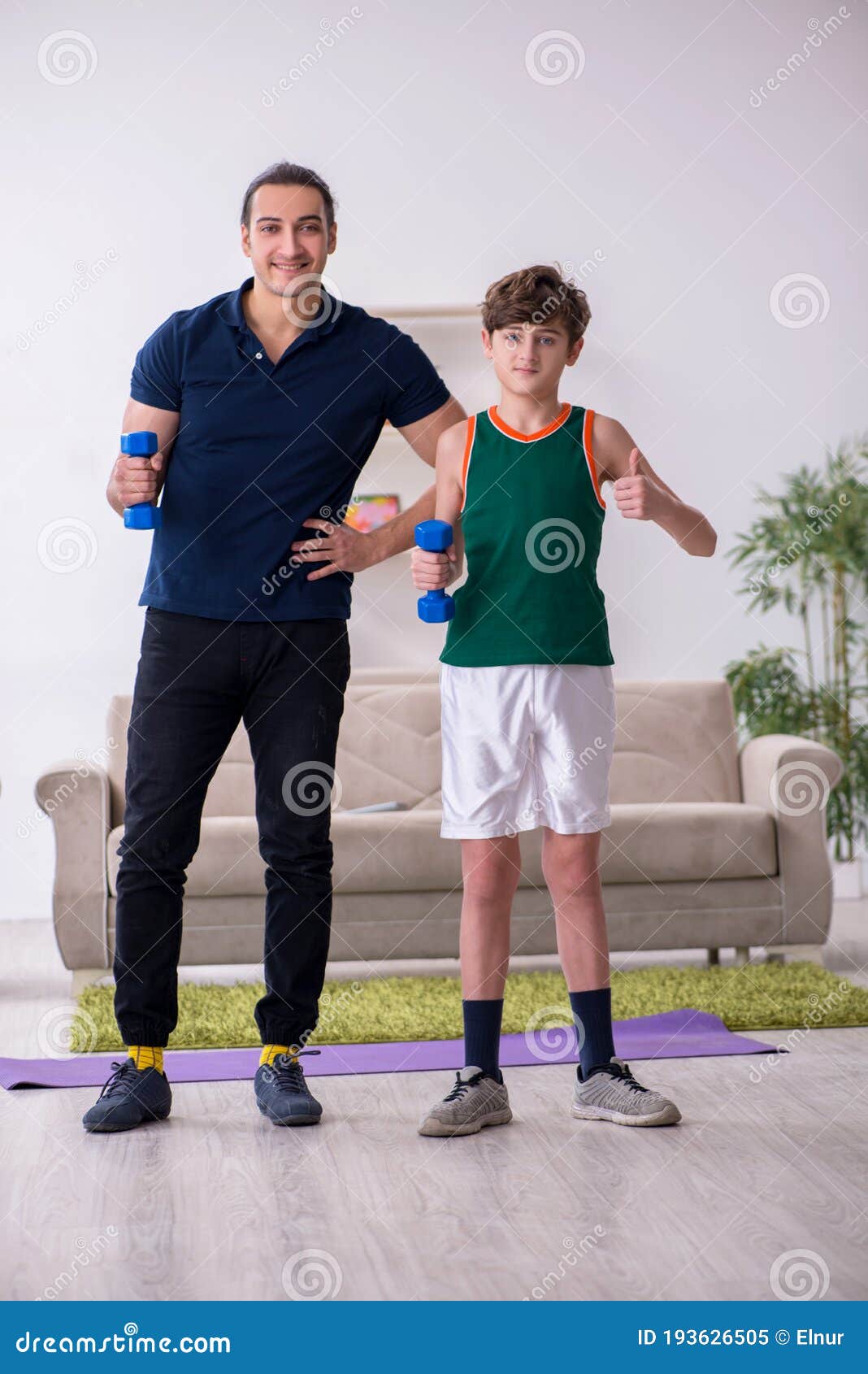 Father and Son Doing Sport Exercises Indoors Stock Image - Image of ...