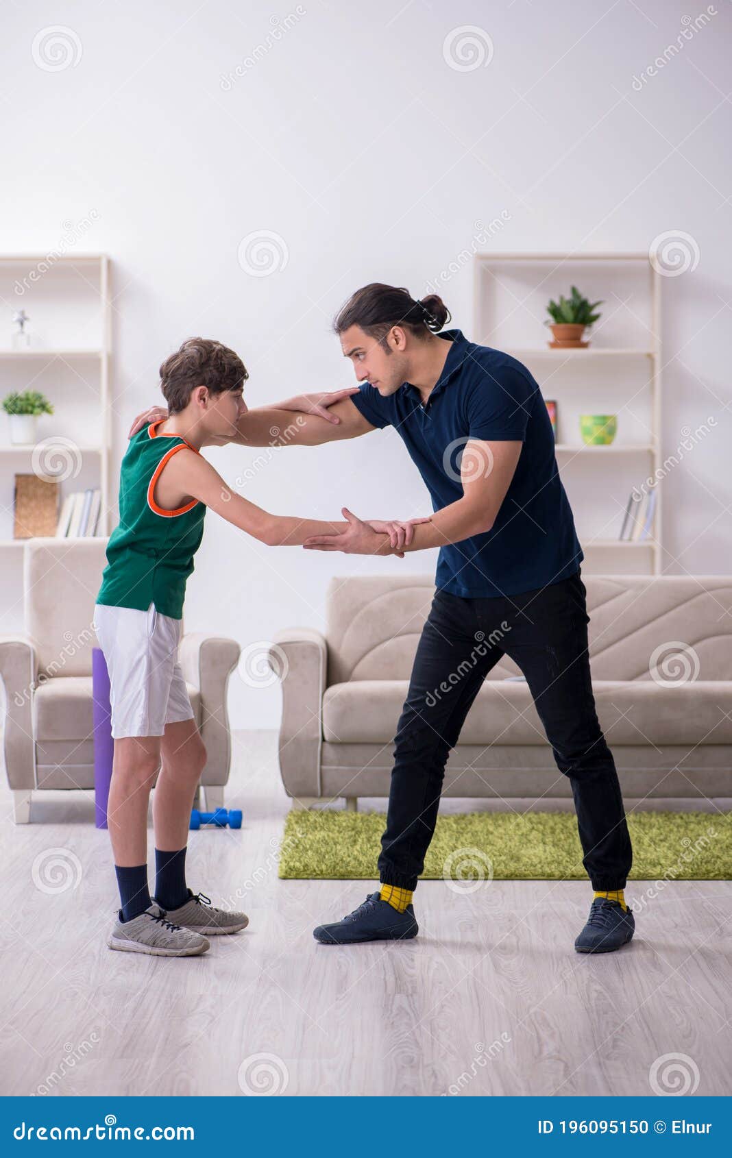 Father and Son Doing Sport Exercises Indoors Stock Photo - Image of ...