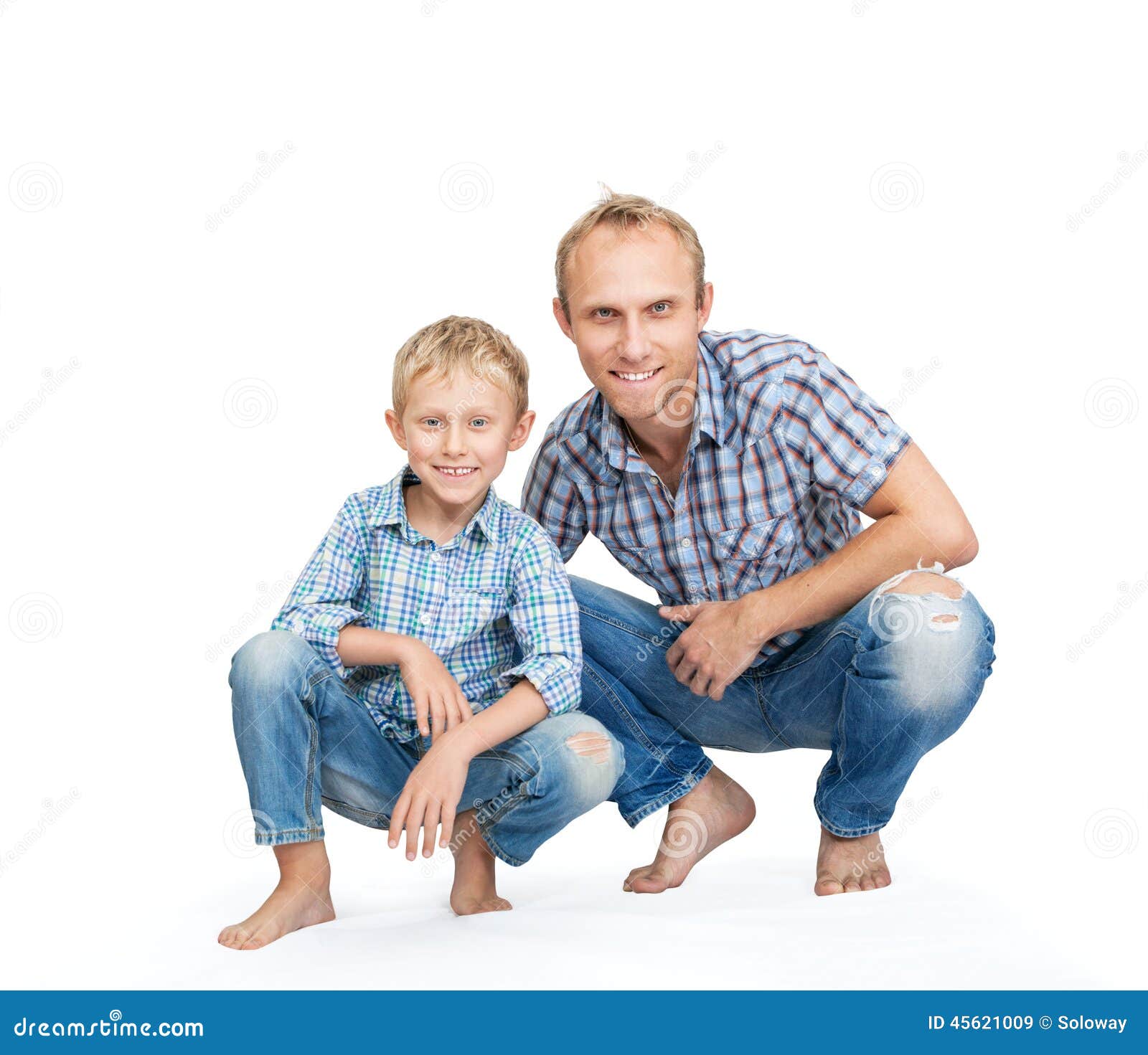 Father with Son Dressed in Jeans and Plaid Shirts on the White Stock ...