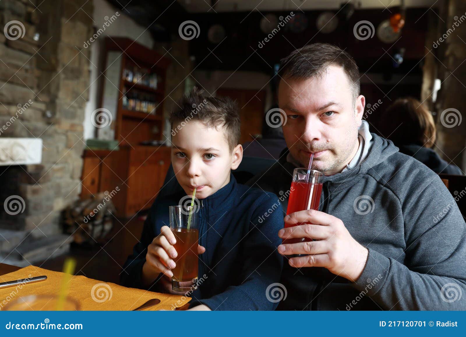 Father with Son Drinking Juice Stock Image - Image of breakfast ...